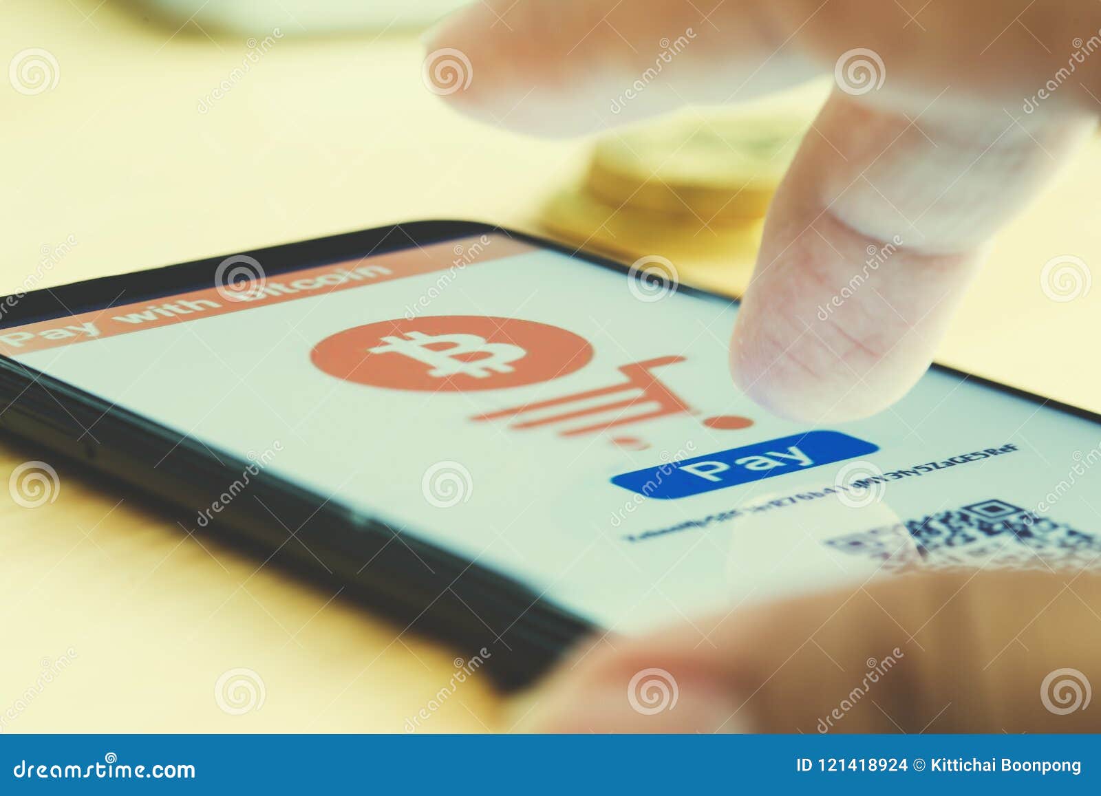 Man Uses Smart Phone Pay with Bitcoin Stock Photo - Image of machines ...