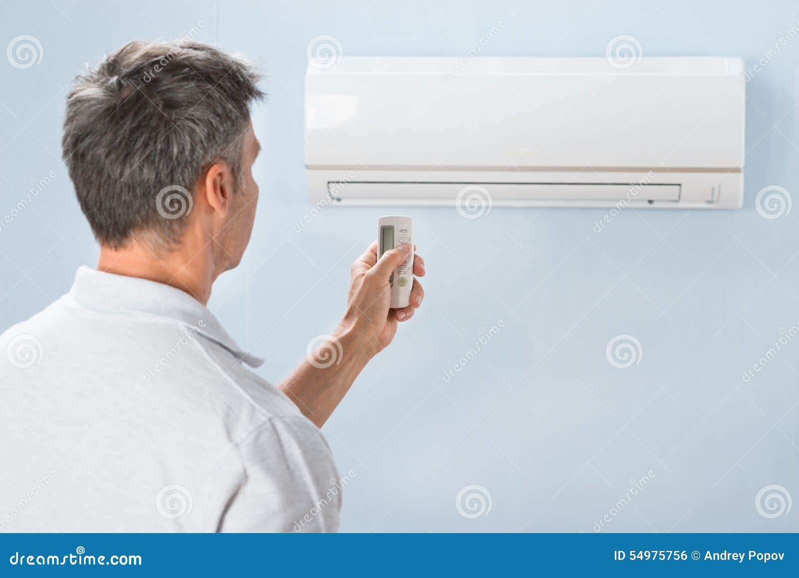 Man Using Air Conditioner Remote Stock Photo - Image of conditioning ...