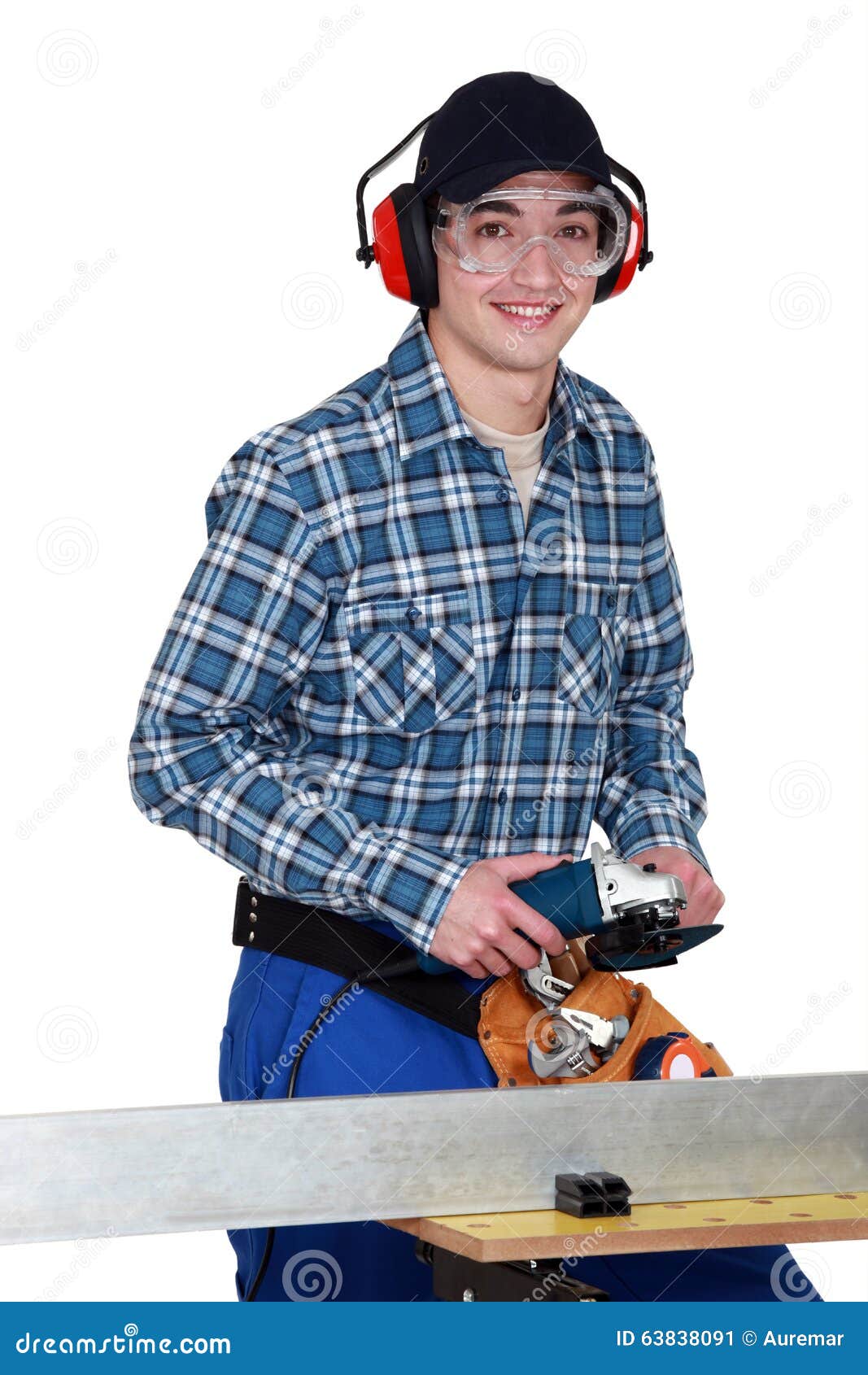Man using angle grinder stock image. Image of building - 63838091