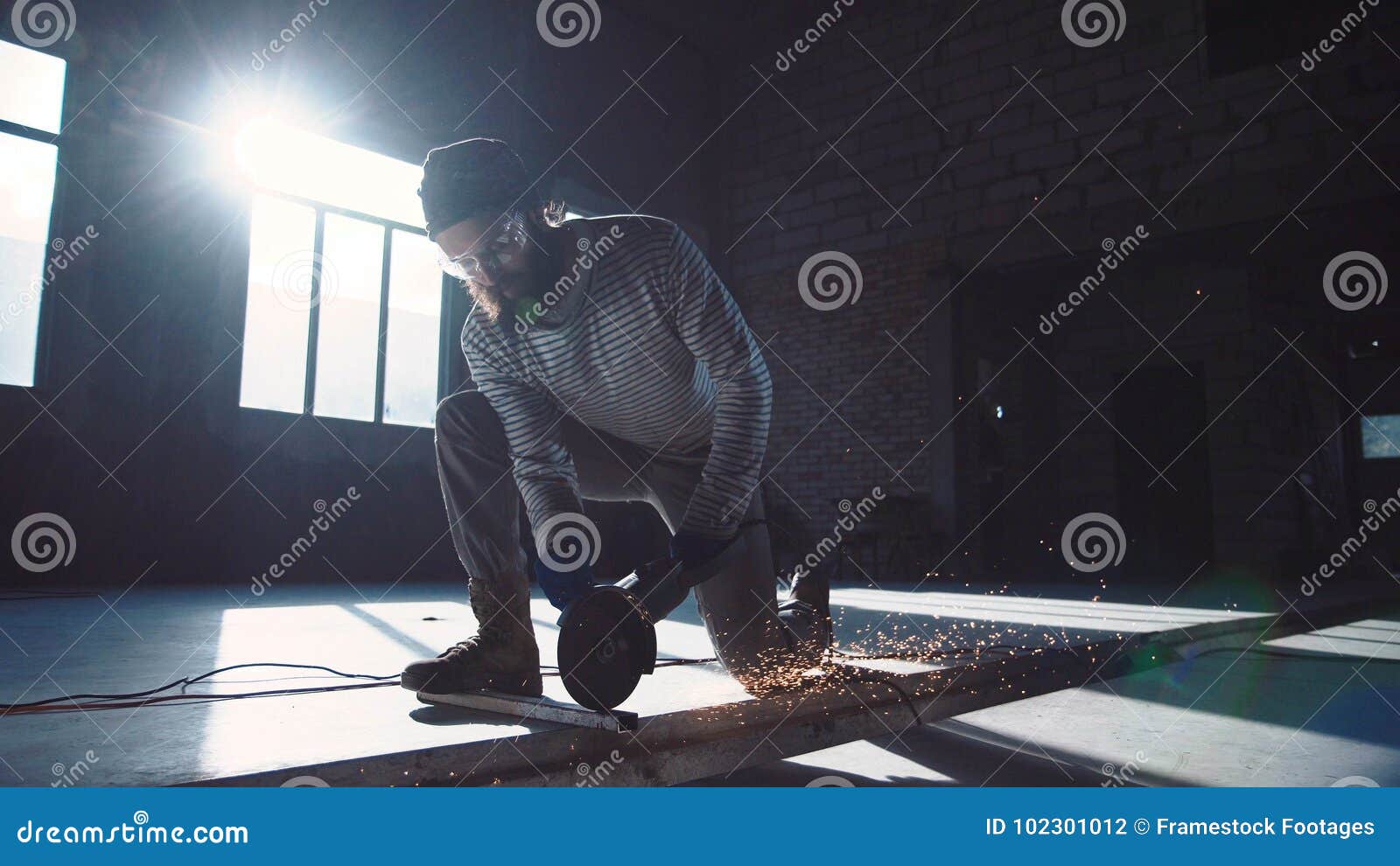 Man using angle grinder stock photo. Image of cutting - 102301012