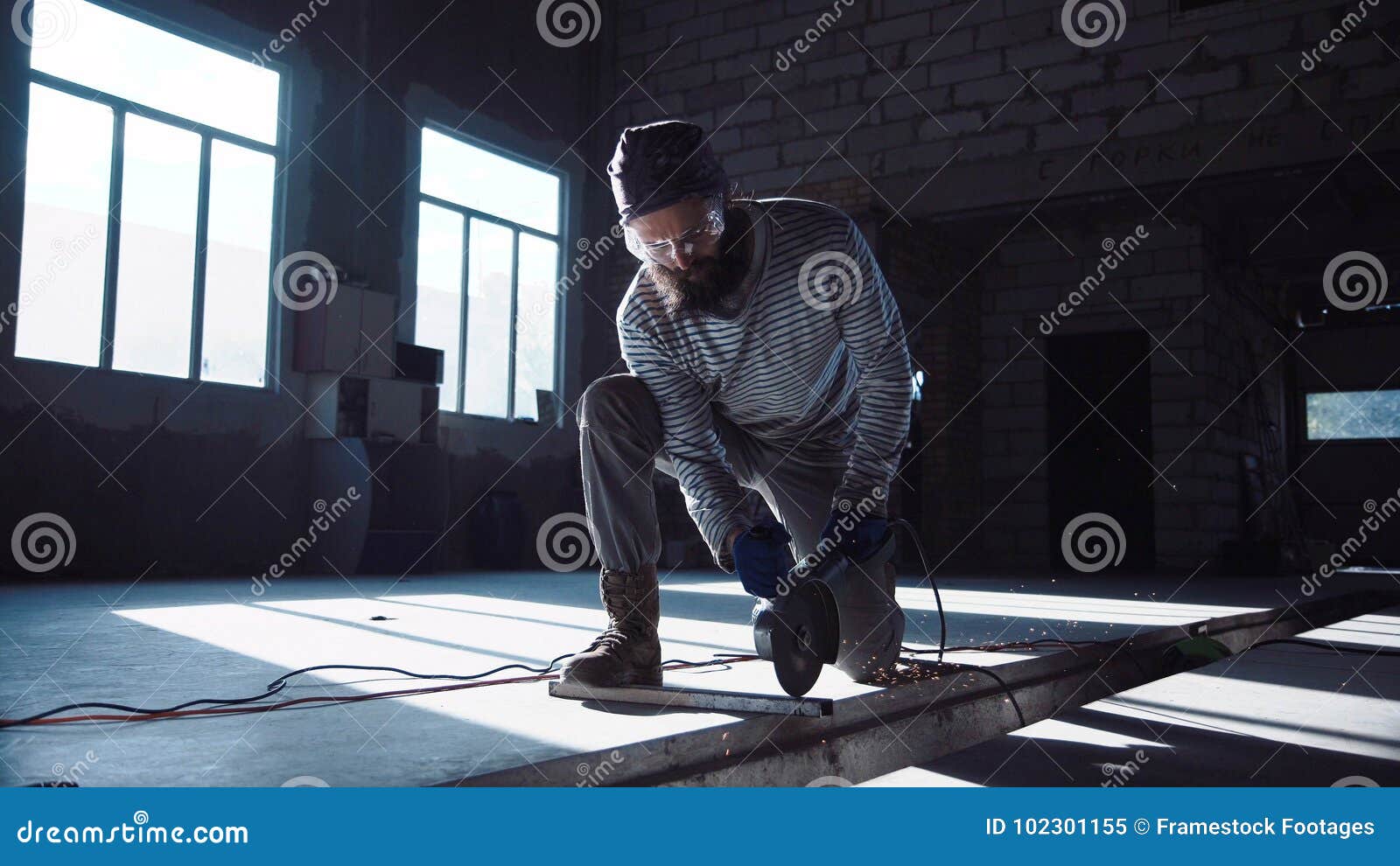Man using angle grinder stock image. Image of grinding - 102301155