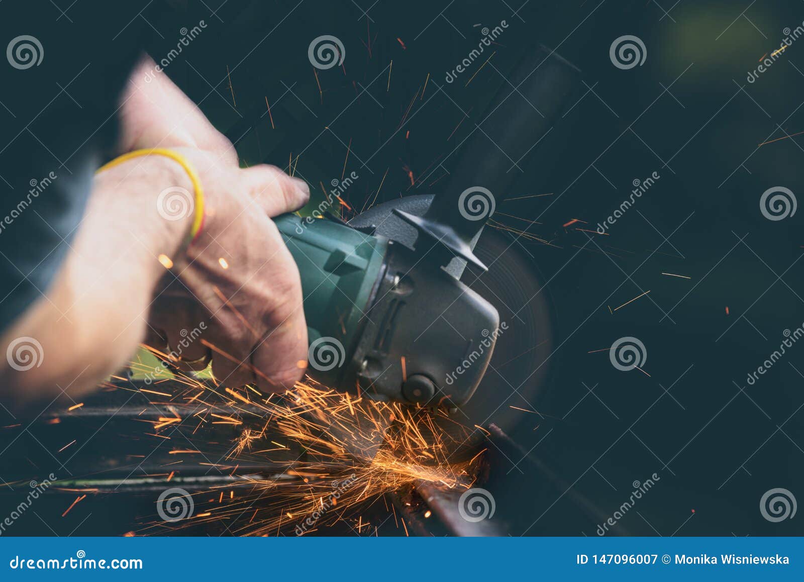 Man using angle grinder stock image. Image of cutter - 147096007