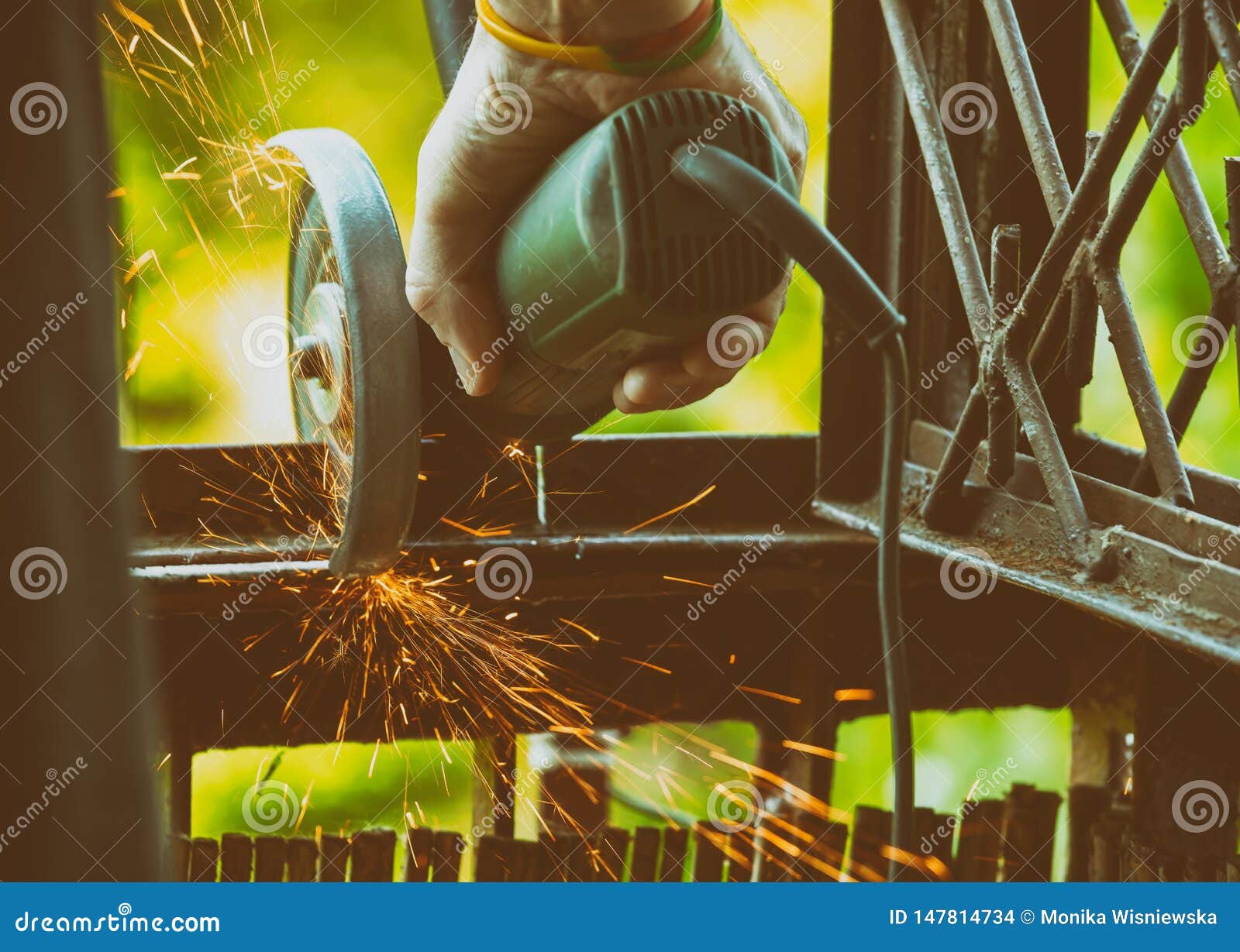 Man using angle grinder stock photo. Image of laborer - 147814734