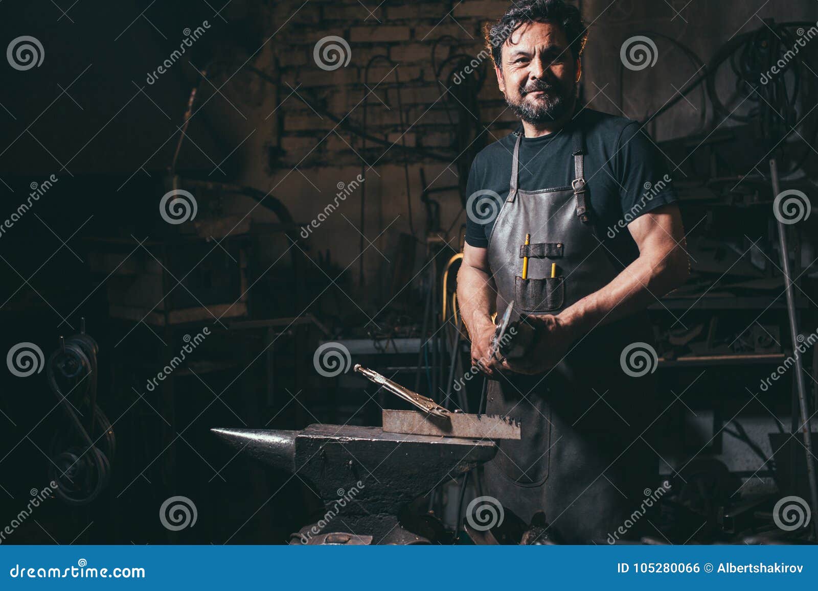 Man Using Angle Grinder in Factory and Throwing Sparks Stock Photo ...