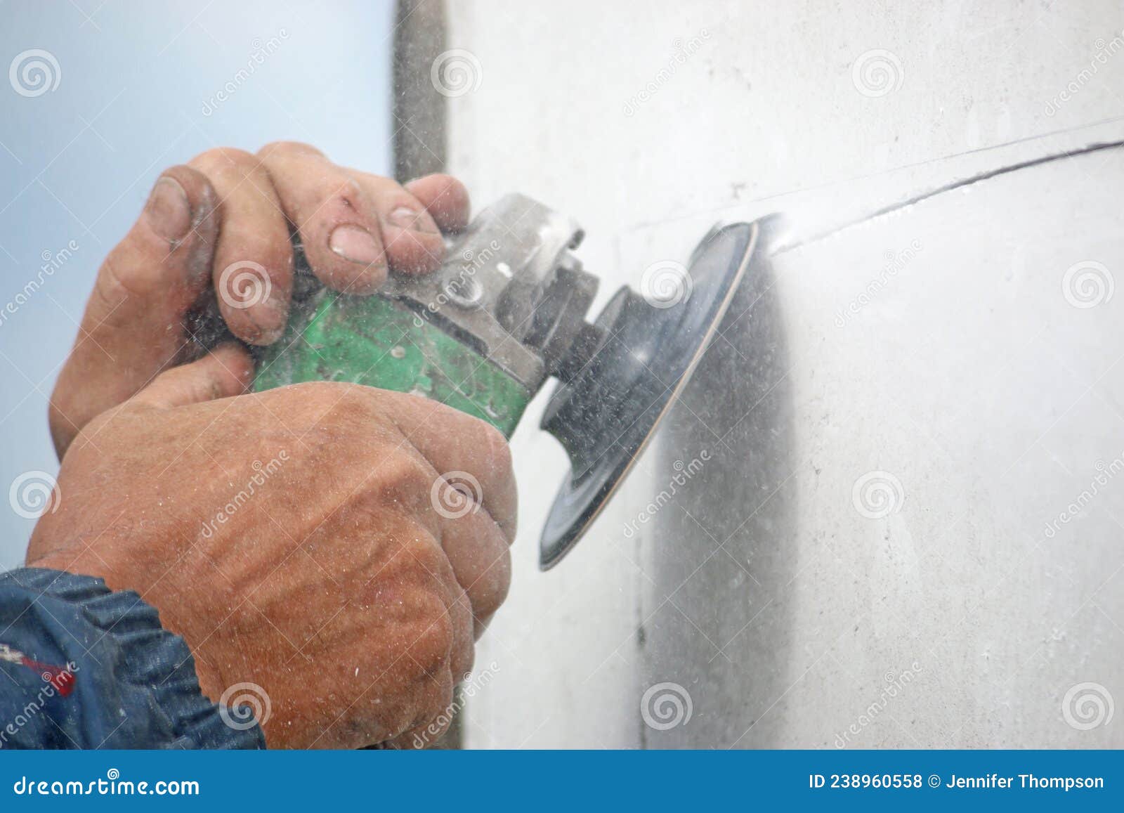 Man using an angle grinder stock photo. Image of fiberglass - 238960558