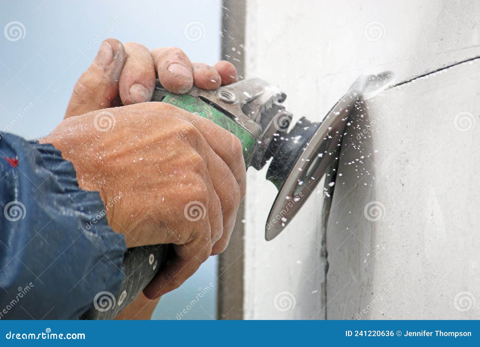 Man using an angle grinder stock photo. Image of hand - 241220636