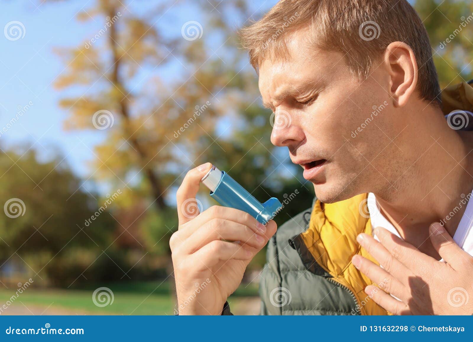 Man Using Asthma Inhaler Outdoors. Stock Photo - Image of discomfort ...