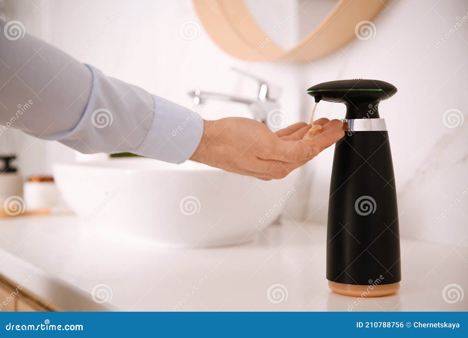Man Using Automatic Soap Dispenser in Bathroom, Closeup Stock Photo ...