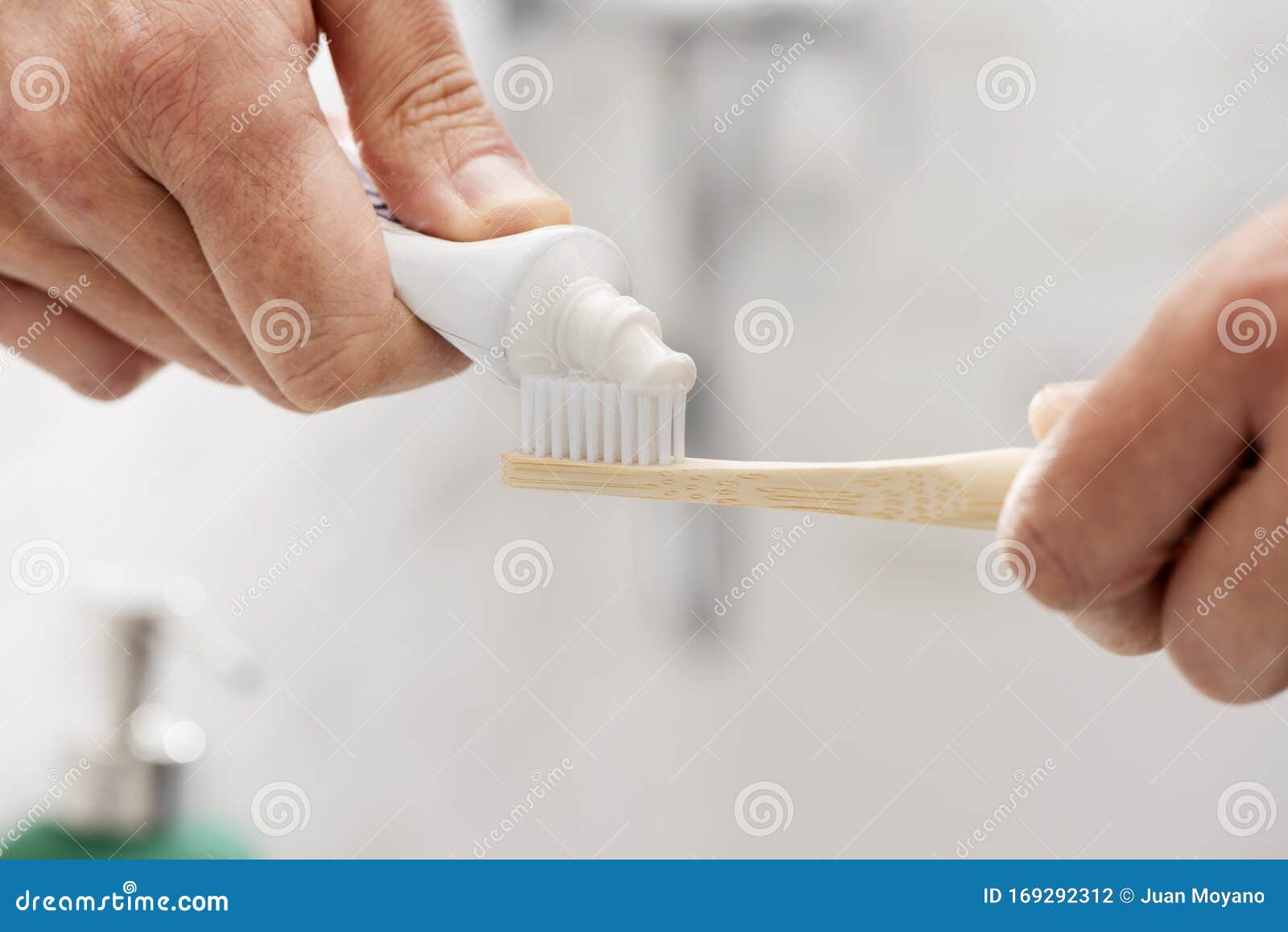 Man Using a Bamboo Toothbrush in the Bathroom Stock Photo - Image of ...