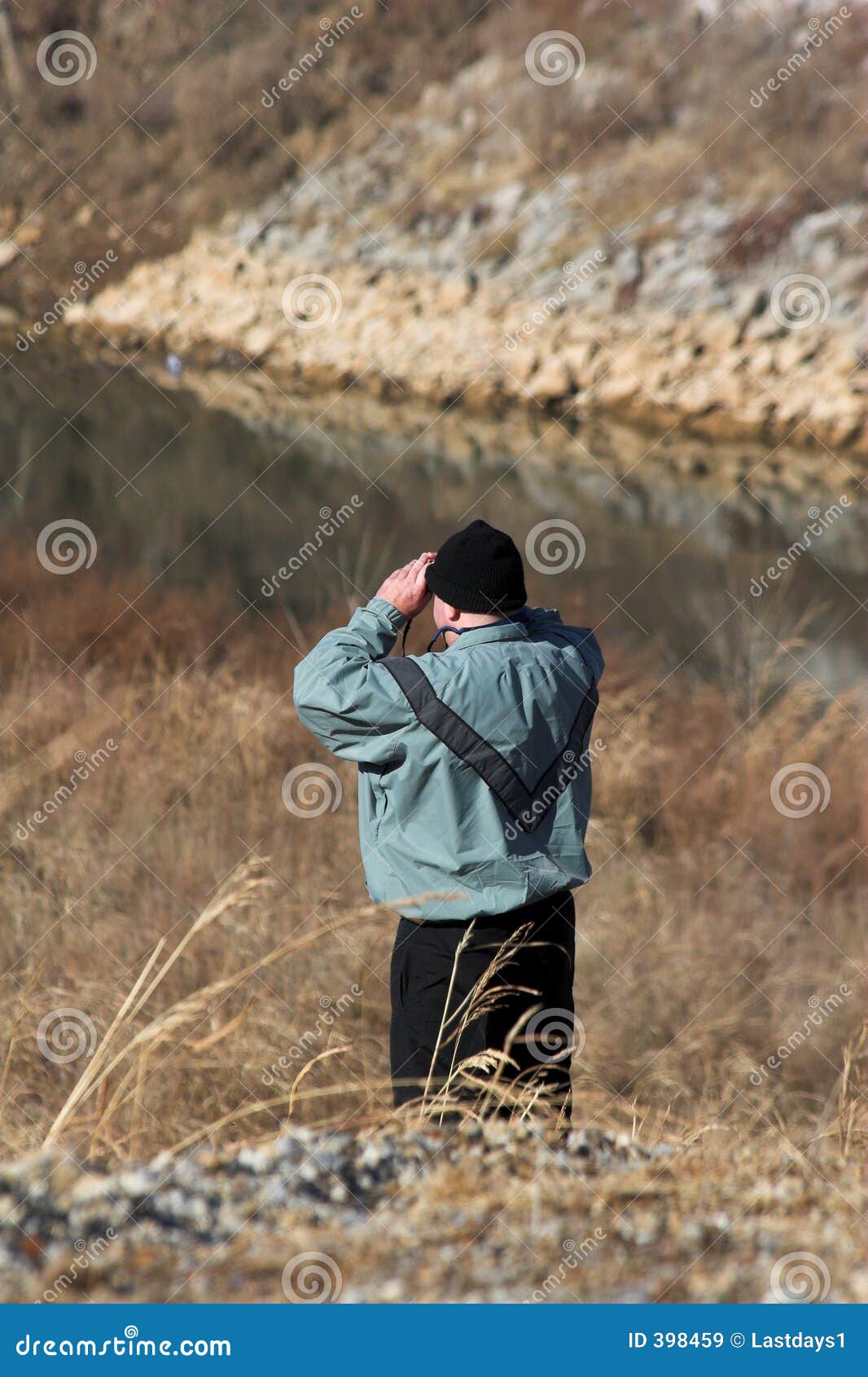Man Using Binoculars Outdoors Stock Image - Image of binoculars, rear ...