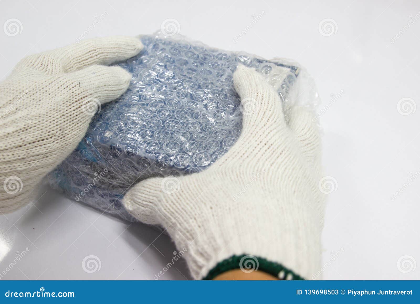 Man are Using a Bubble Wrap Wrapped Packing and Protection Brown Box ...