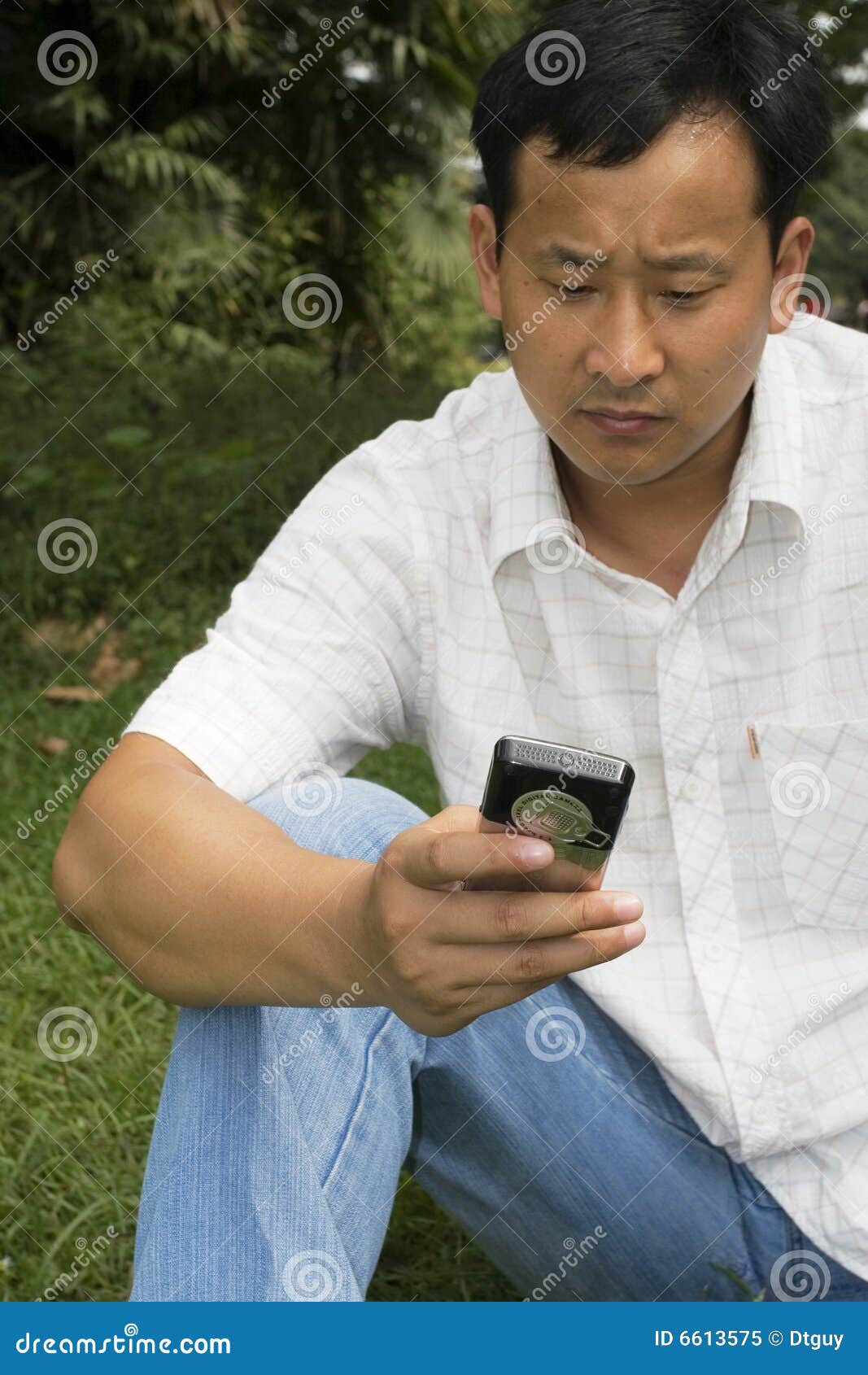 The man using cell phone stock image. Image of black, information - 6613575