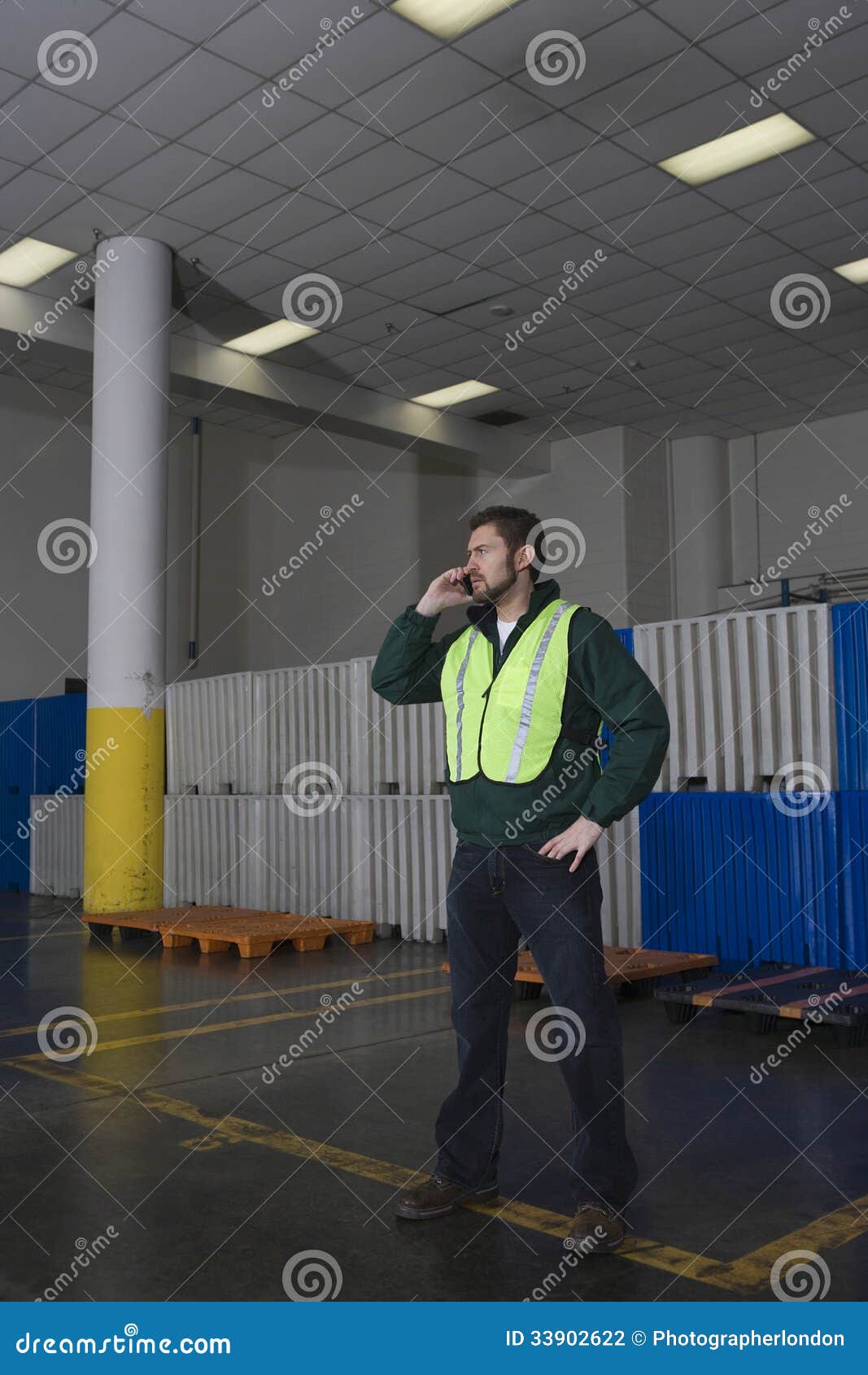 Man Using Cellphone in Factory Stock Photo - Image of protective ...