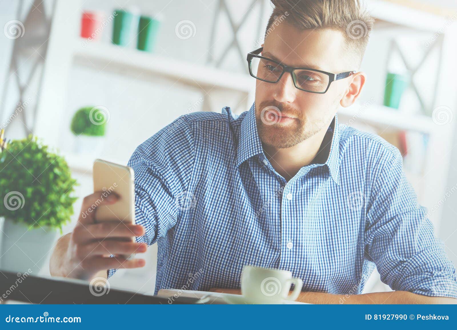 Man using cellphone stock photo. Image of items, break - 81927990