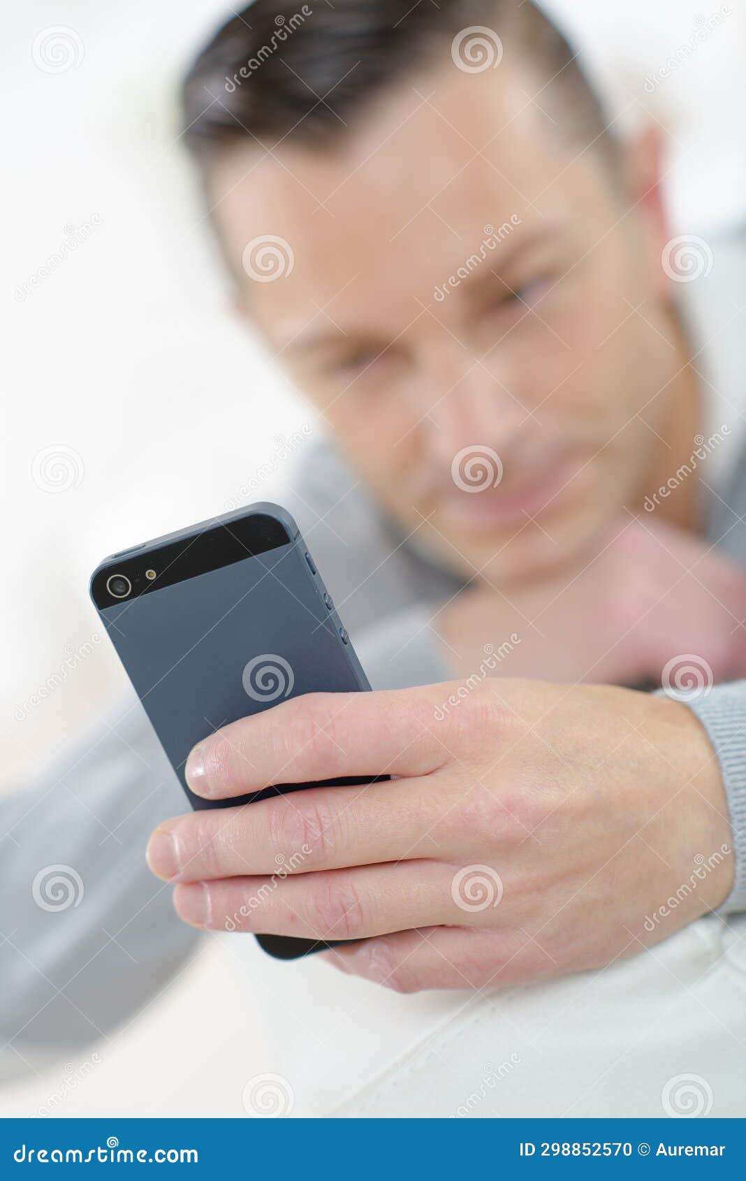 Man using cellular phone stock photo. Image of work - 298852570