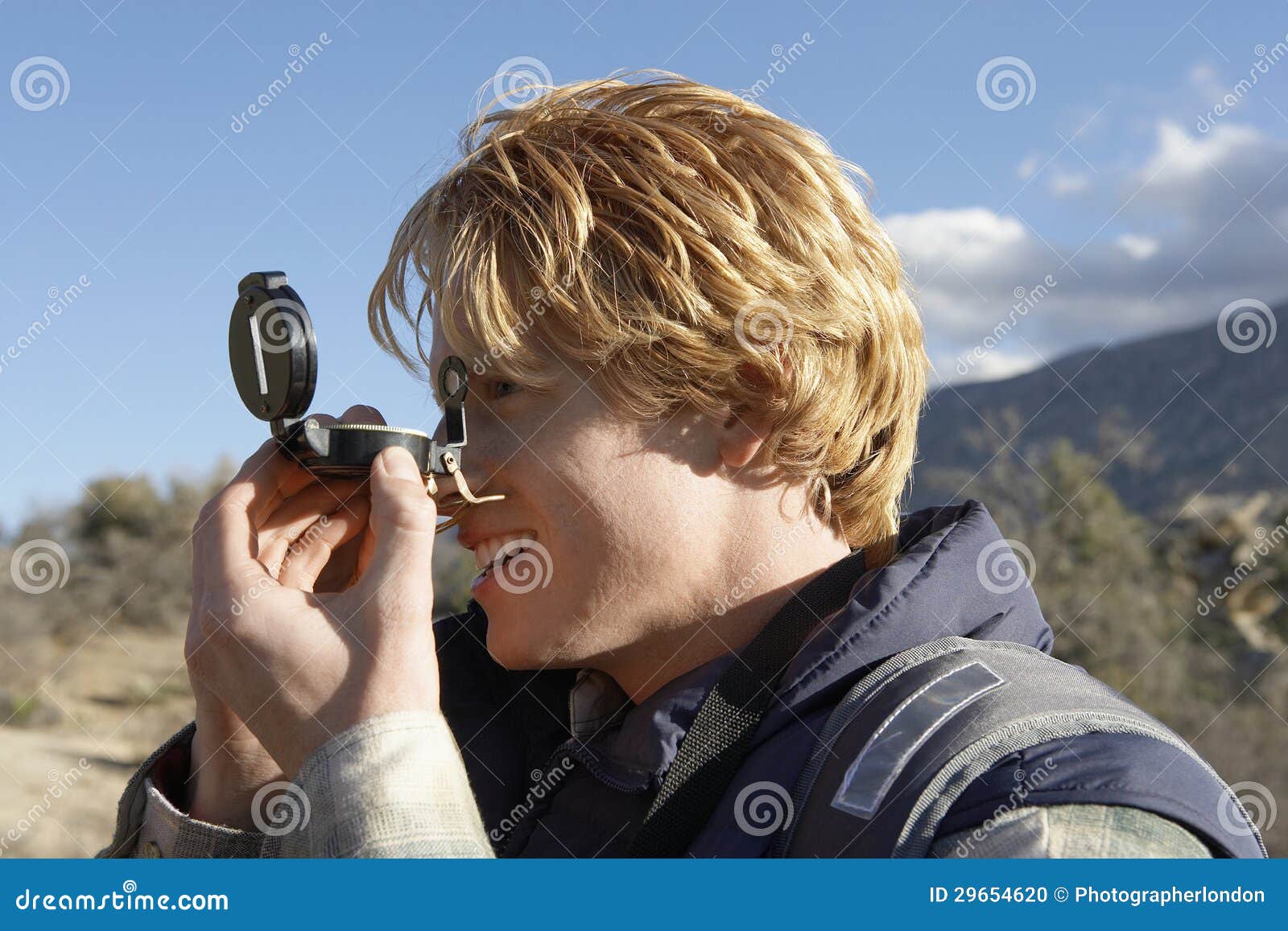 Man Using Compass stock photo. Image of concentration - 29654620