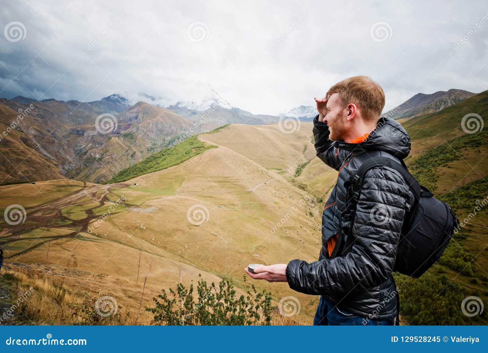 Man using a compass stock image. Image of view, hand - 129528245