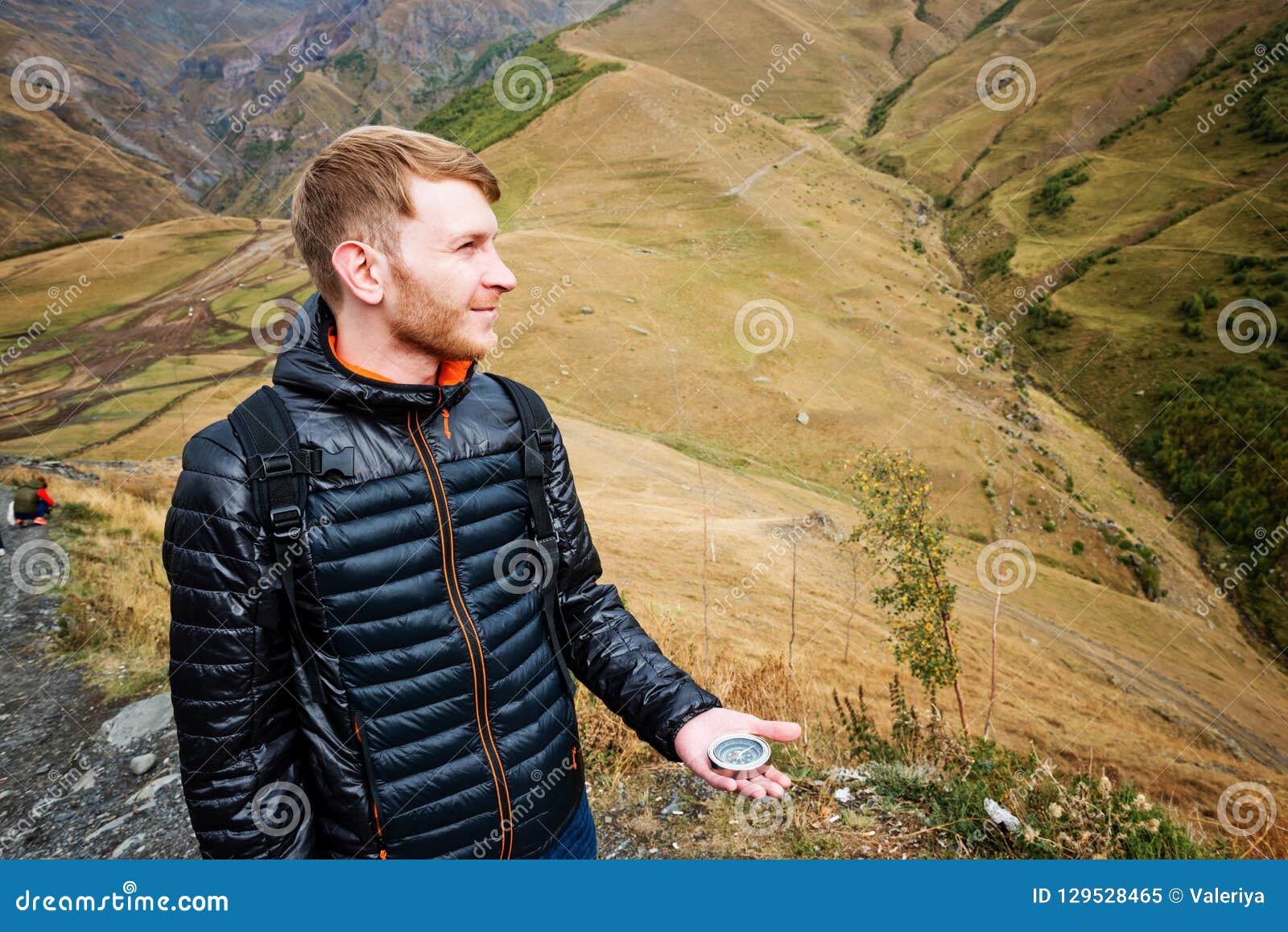 Man using a compass stock image. Image of hiker, mountains - 129528465