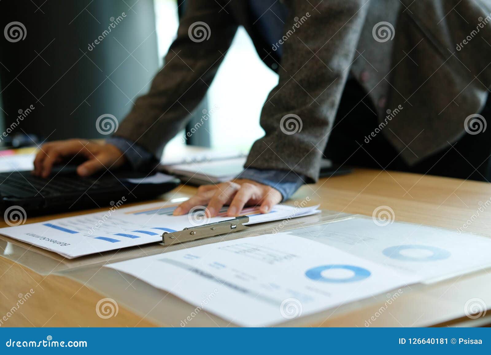 Man Using Computer. Businessman Working with Financial Graph Chart ...