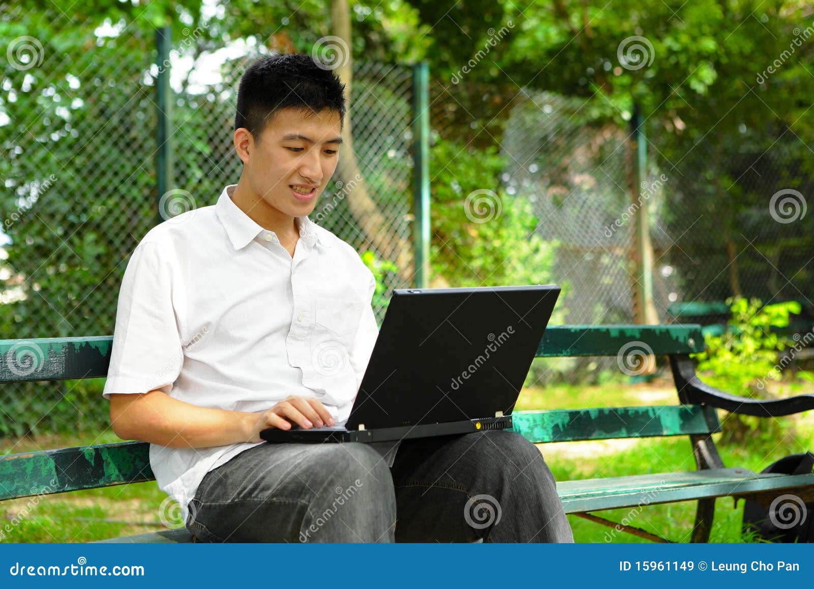 Man using computer outdoor stock image. Image of china - 15961149