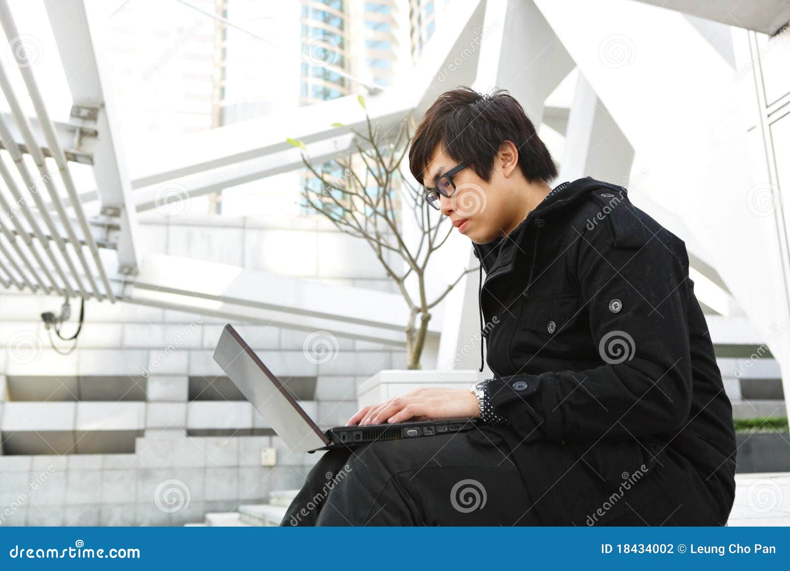 Man using computer outdoor stock photo. Image of hand - 18434002