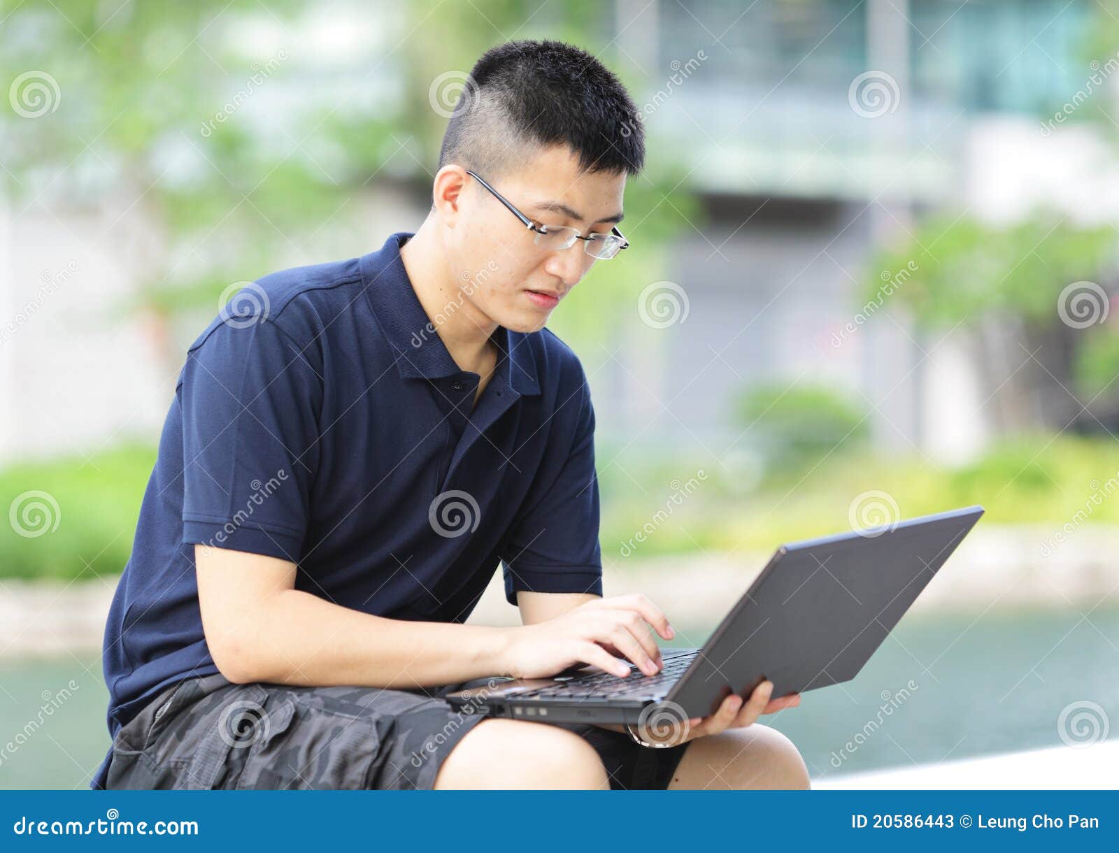 Man using computer outdoor stock image. Image of typing - 20586443