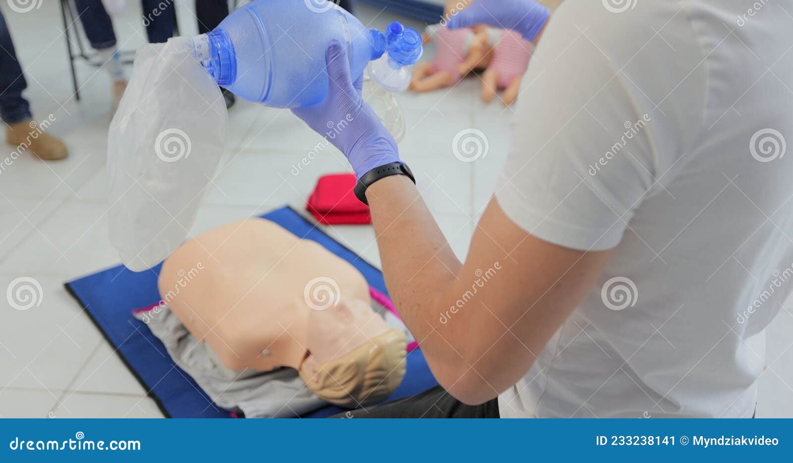 Man Using CPR Technique on Dummy in First Aid Class. Oxigen Mask on ...
