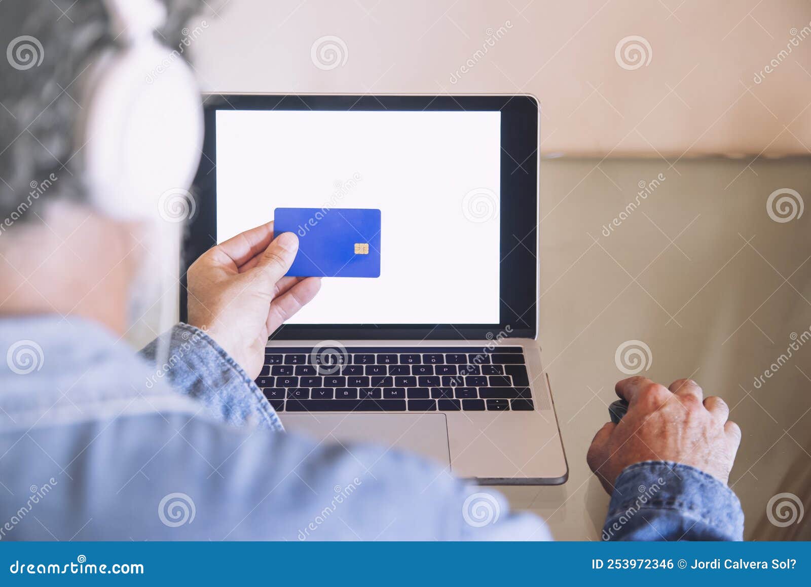 Man Using Credit Card and Laptop while Shopping Online Stock Photo ...