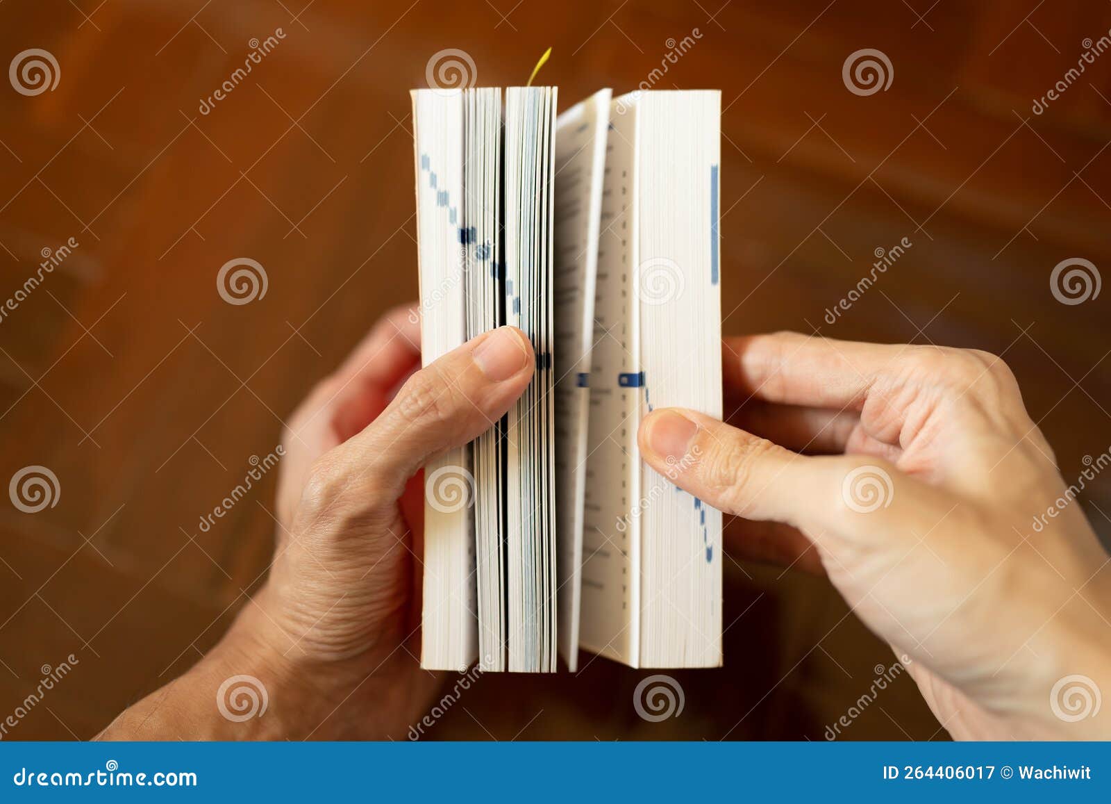 A Man Using Dictionary To Find a Definition of Words Stock Image ...