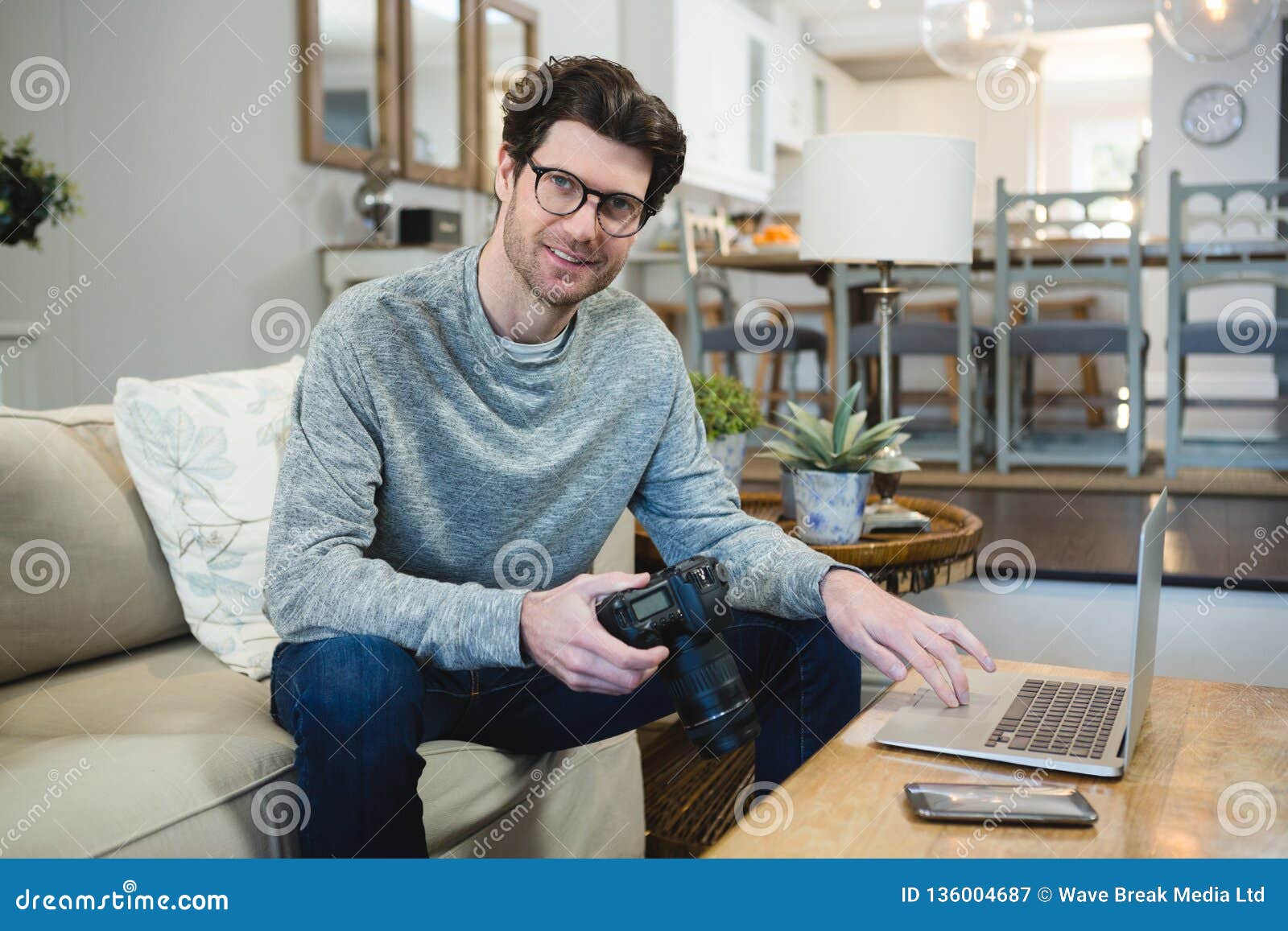 Man Using Digital Camera in Living Room Stock Image - Image of life ...