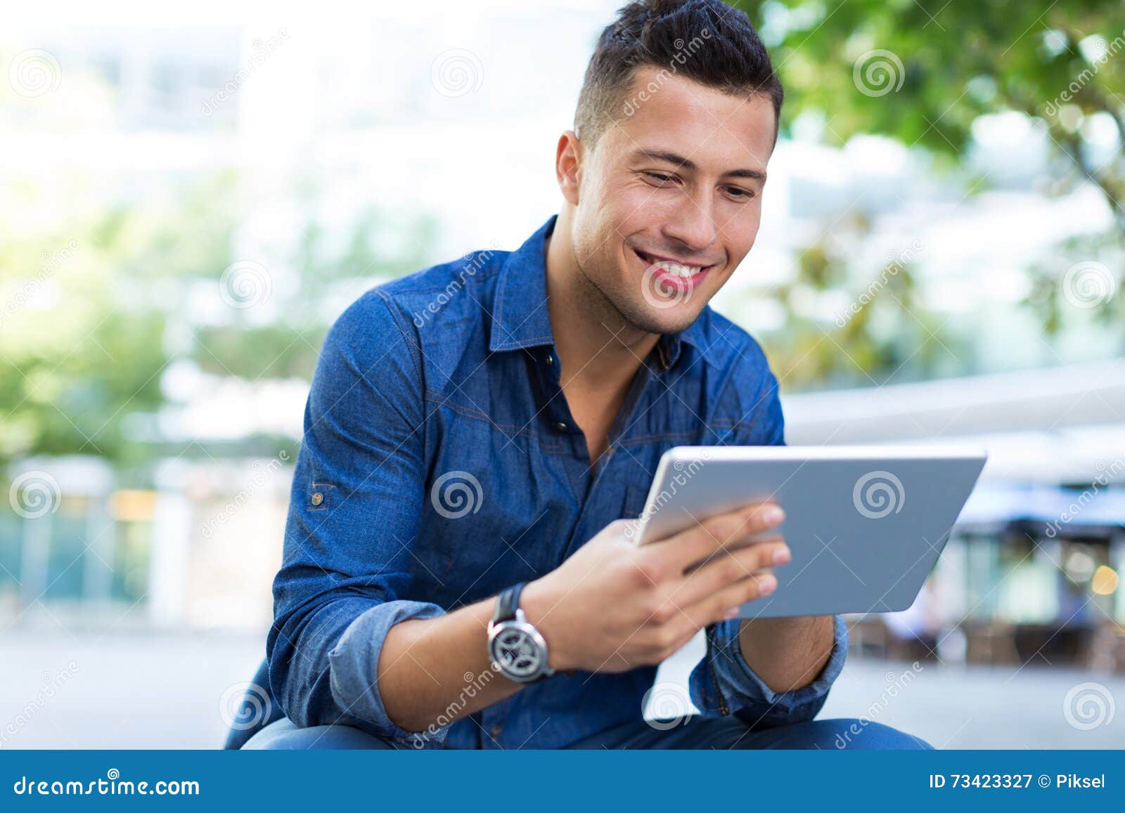Man Using Digital Tablet Outdoors Stock Image - Image of adult, smiling ...