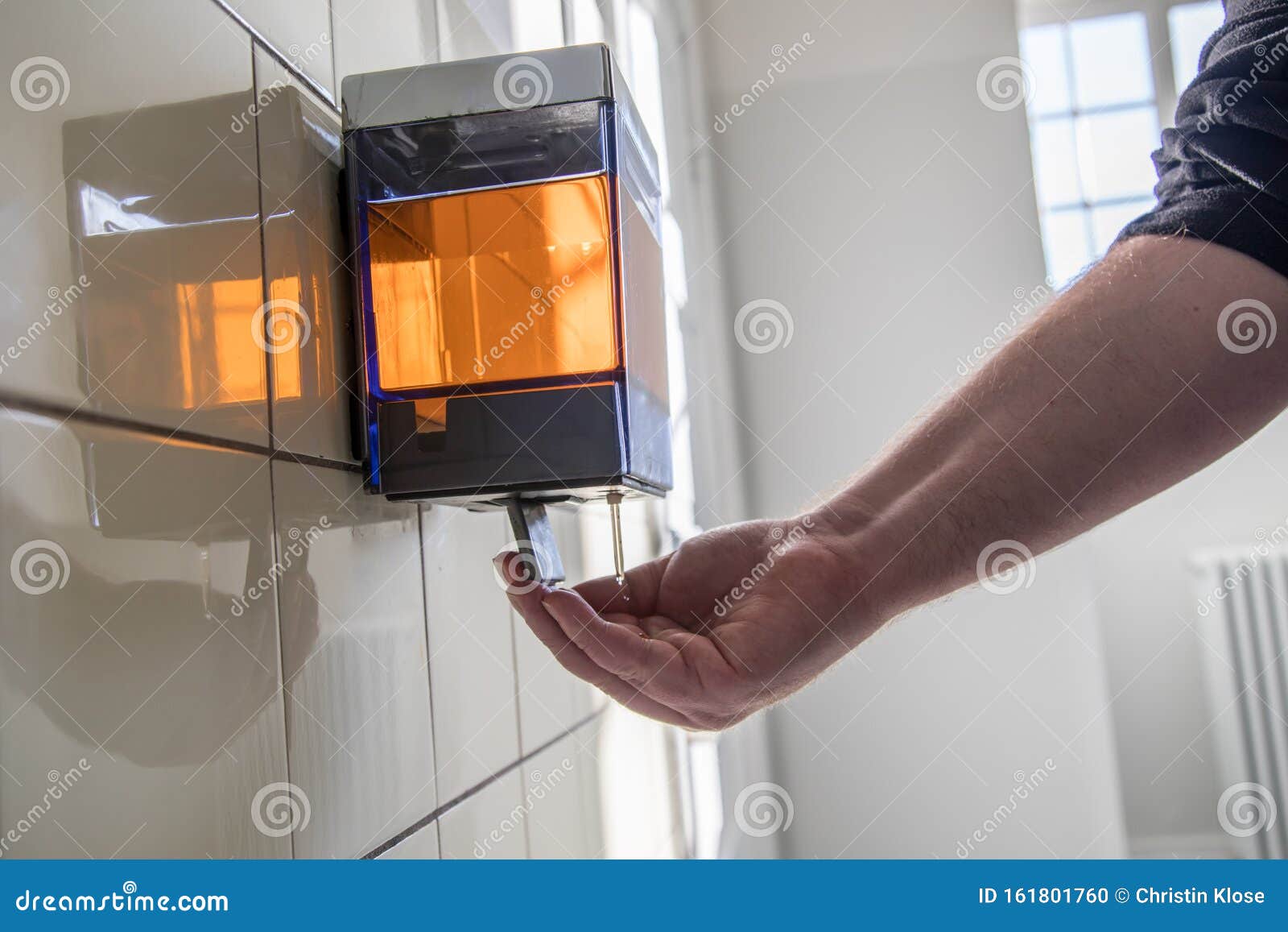 Man Using Dispenser with Liquid Soap for Washing Hands Stock Photo ...