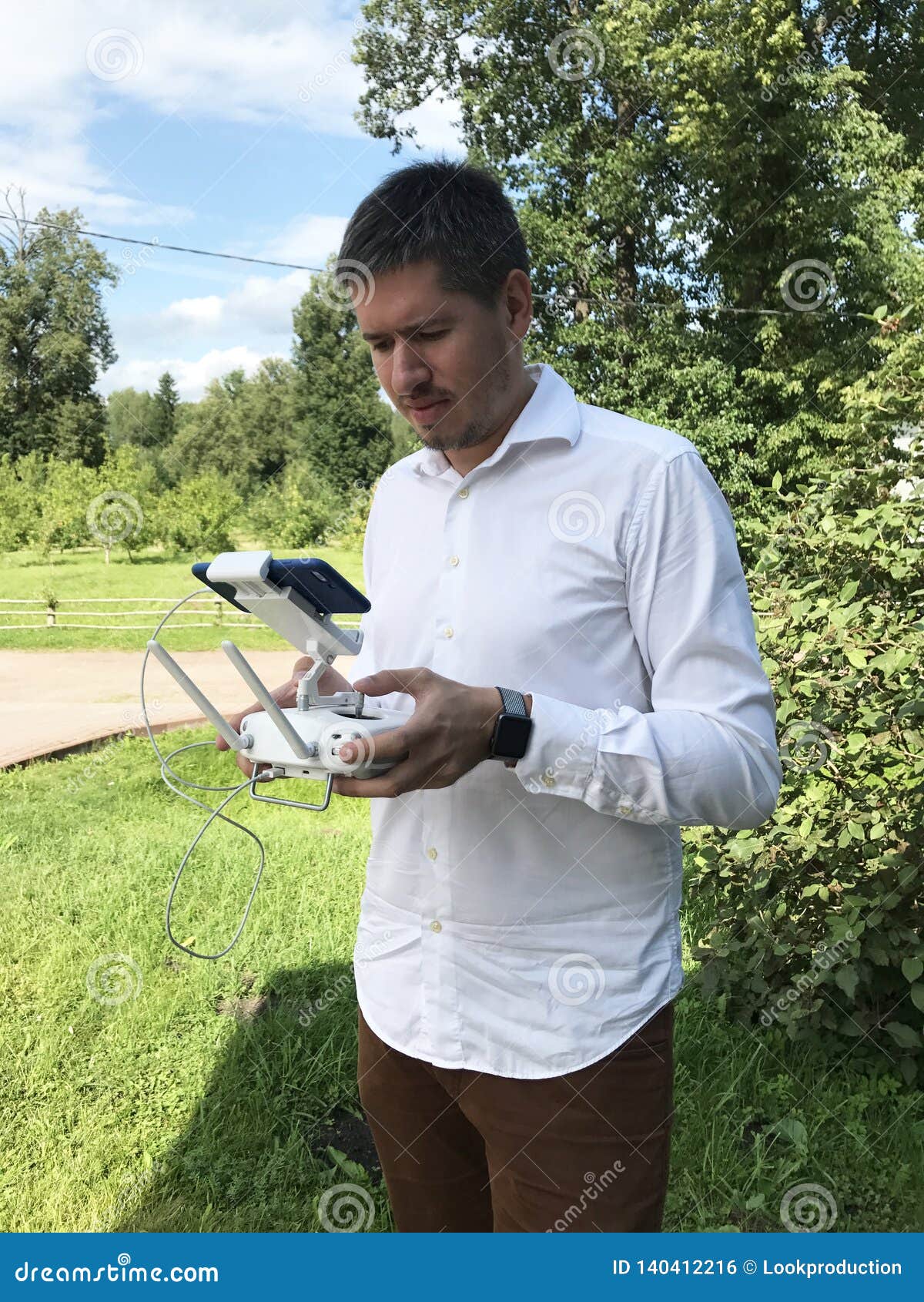 Man Using Drone, Holding Remote Controller in Hands Stock Photo - Image ...