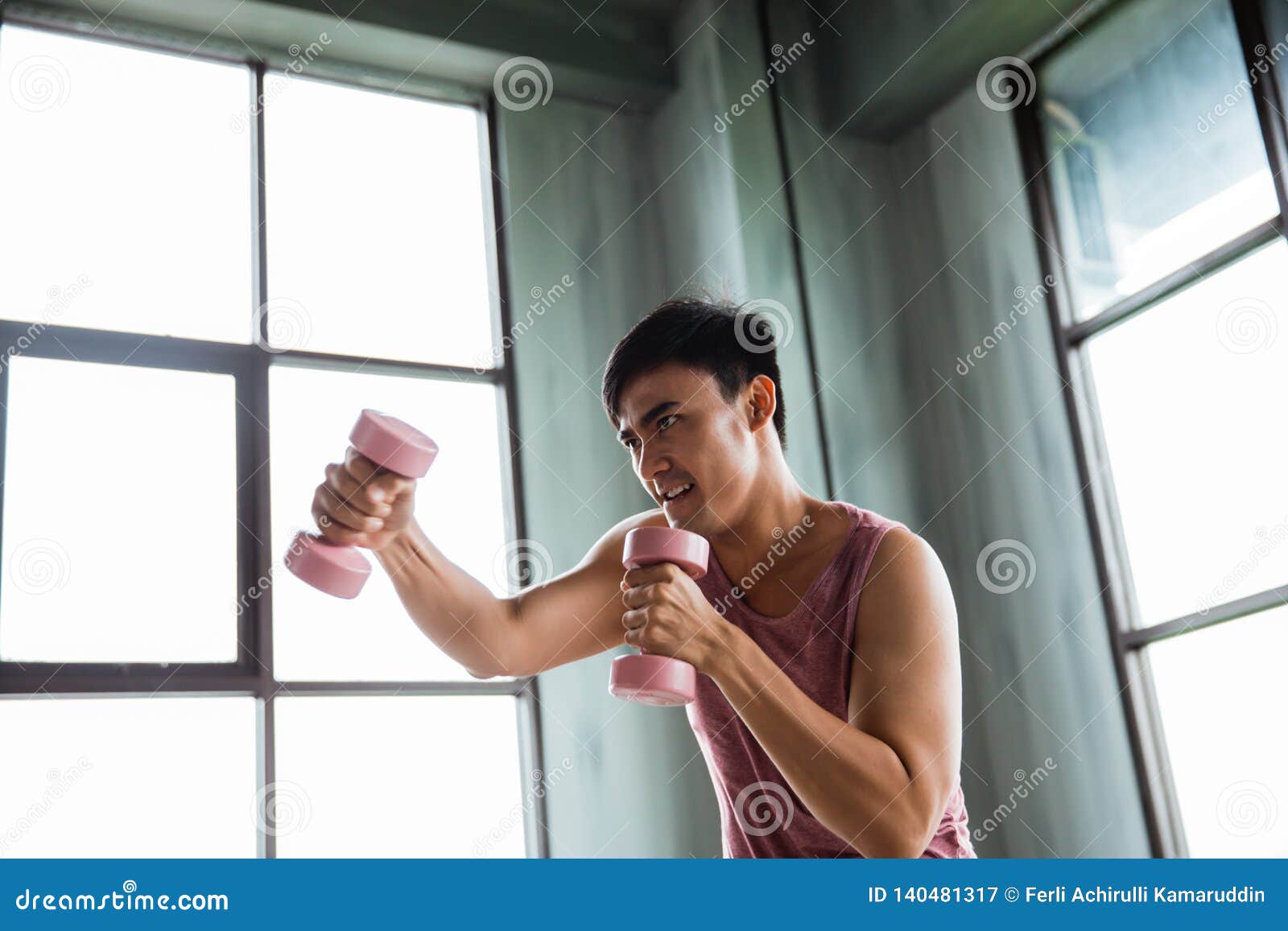 Man Using Dumbbell Doing Some Boxing Exercise Stock Image - Image of ...