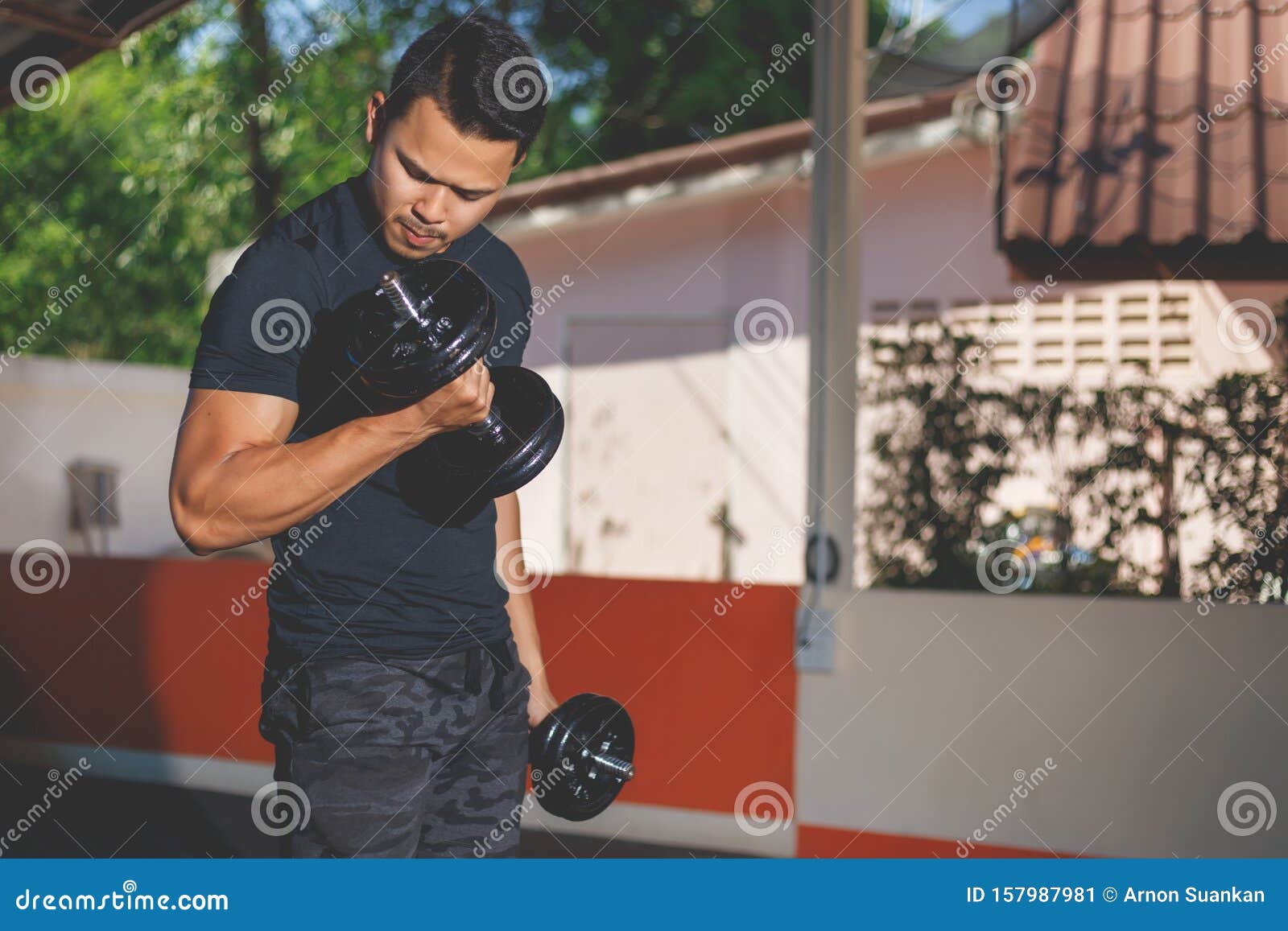Man Using Dumbbell for Exercise Stock Image - Image of fitness, sport ...