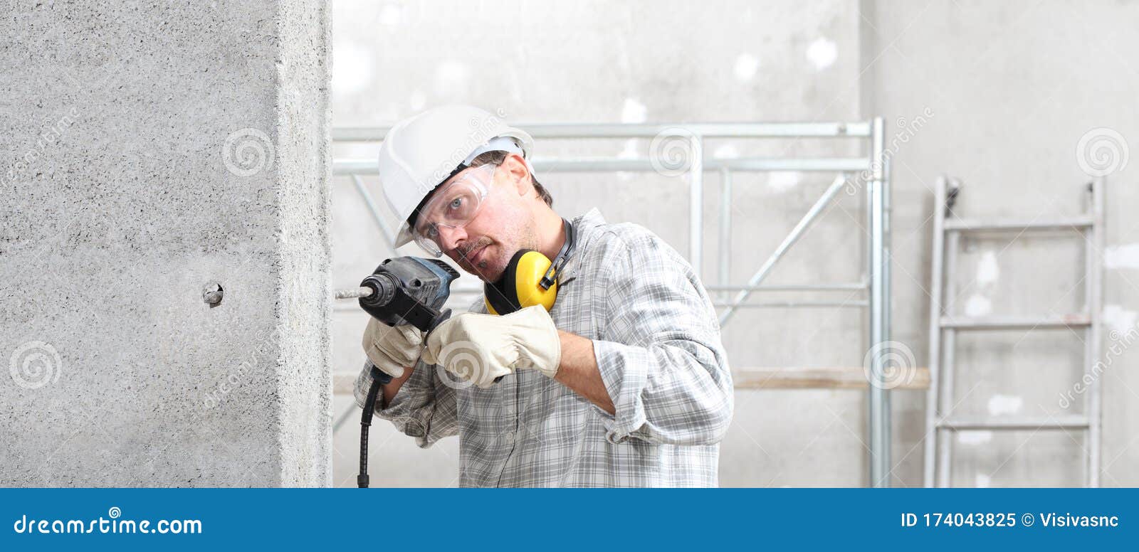 Man Using an Electric Pneumatic Drill Making a Hole in Wall ...