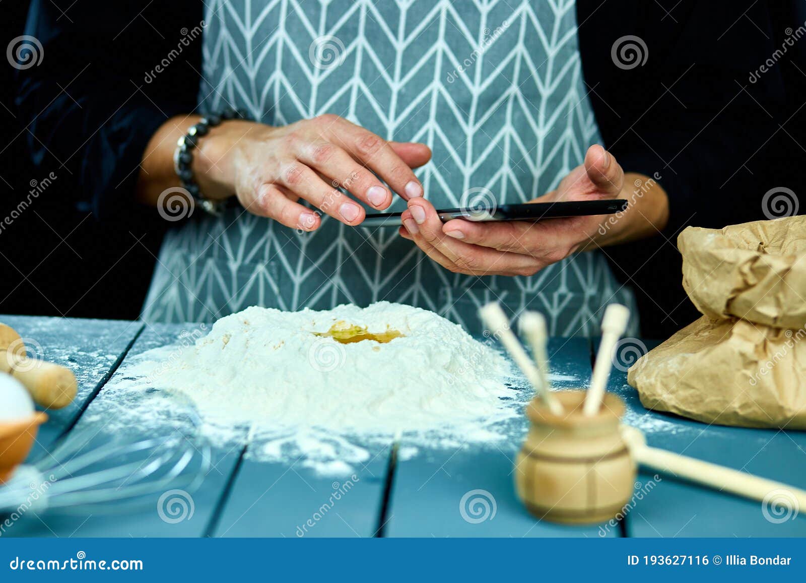 Man Using Electronic Tablet Pc in Kitchen for Baking Stock Photo ...