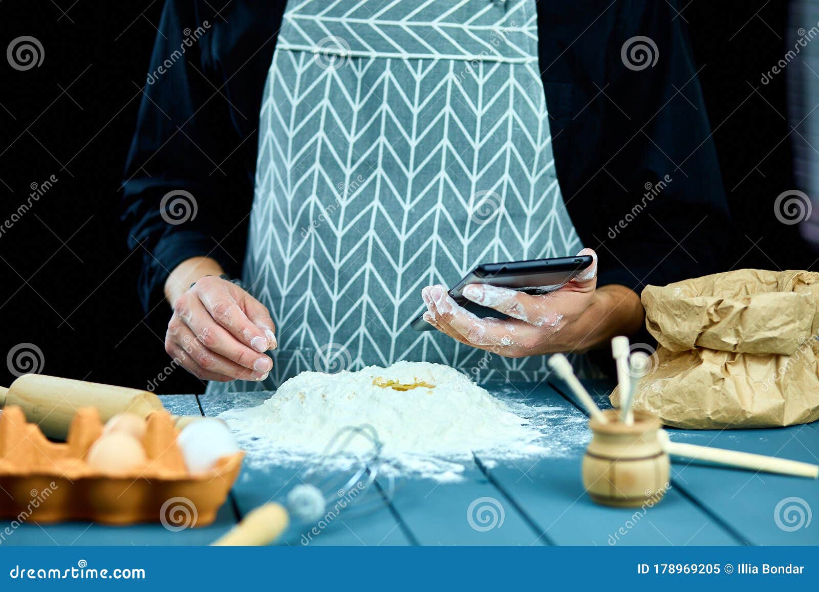 Man Using Electronic Tablet Pc in Kitchen for Baking Stock Image ...