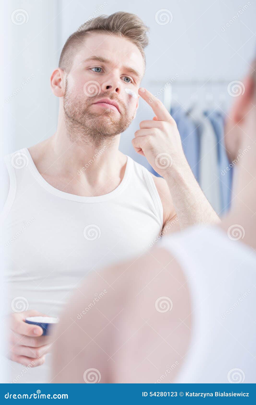 Man using face cream stock image. Image of moisturizer - 54280123