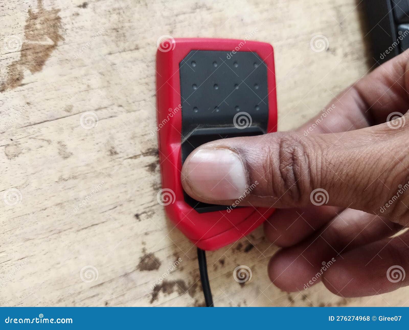 Man Using Fingerprint Device for Payment System in India. Stock Photo ...