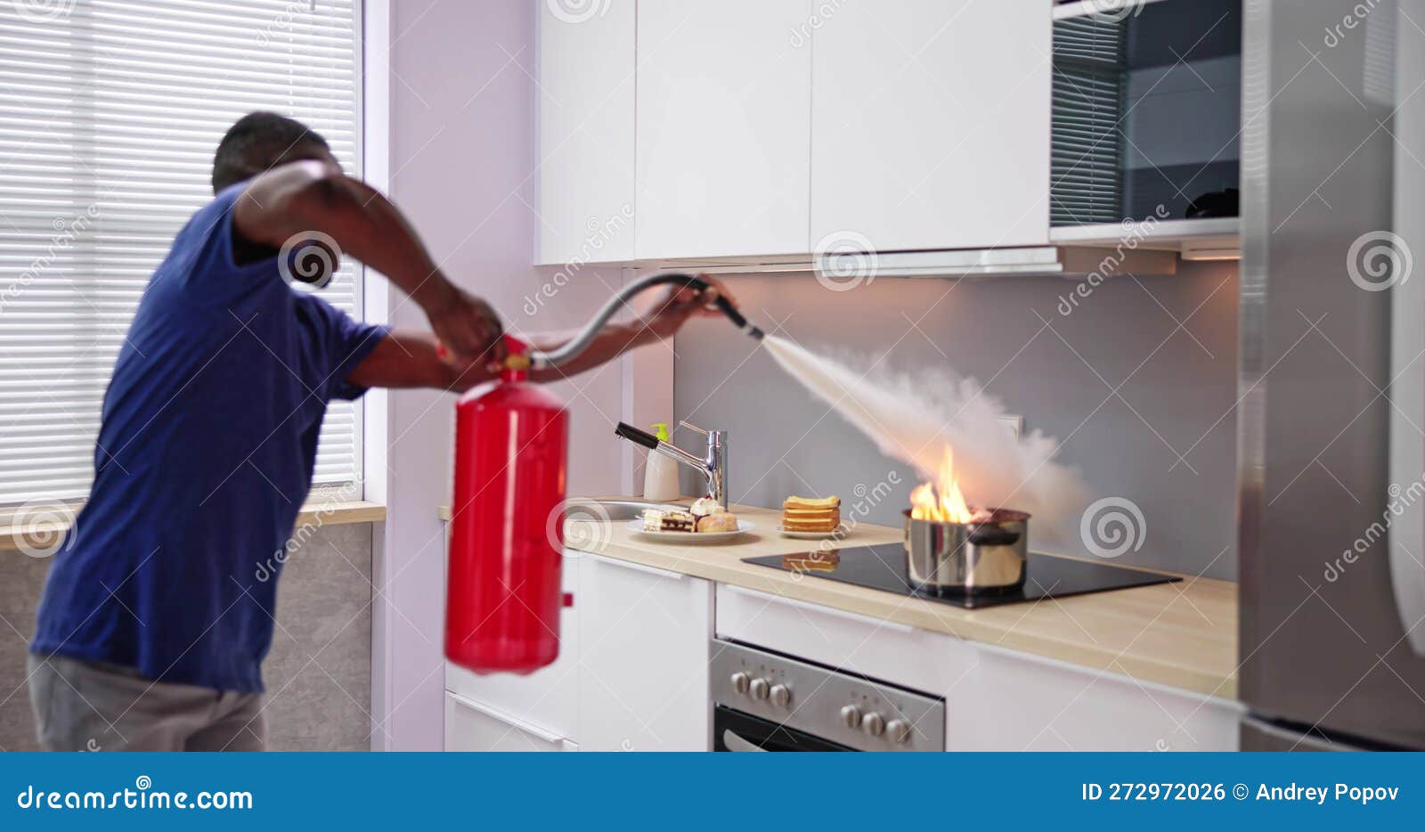 Man Using Fire Extinguisher To Stop Fire Stock Photo - Image of african ...