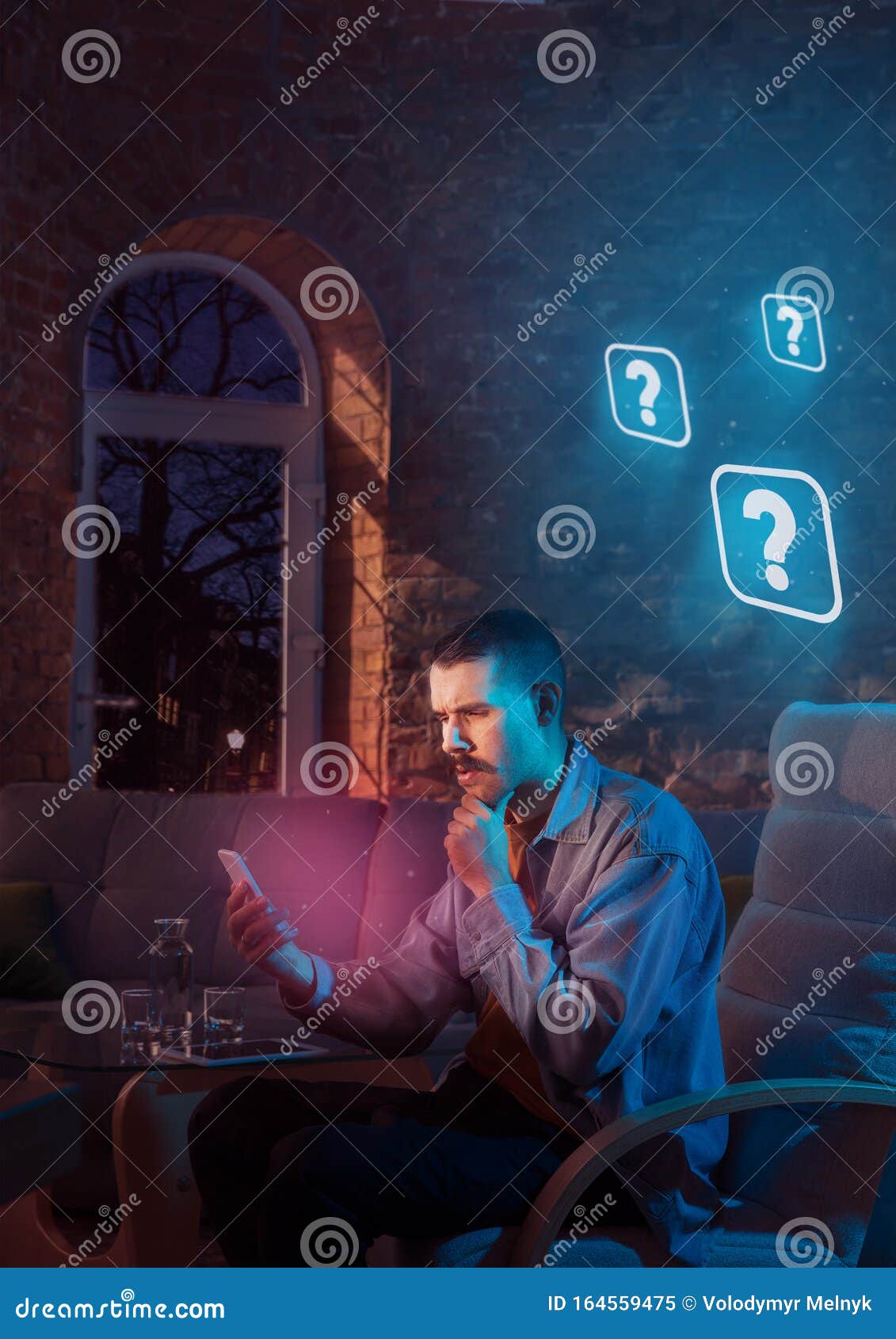 Man Using Gadget and Receive Neon Notifications at Home at Night Stock ...