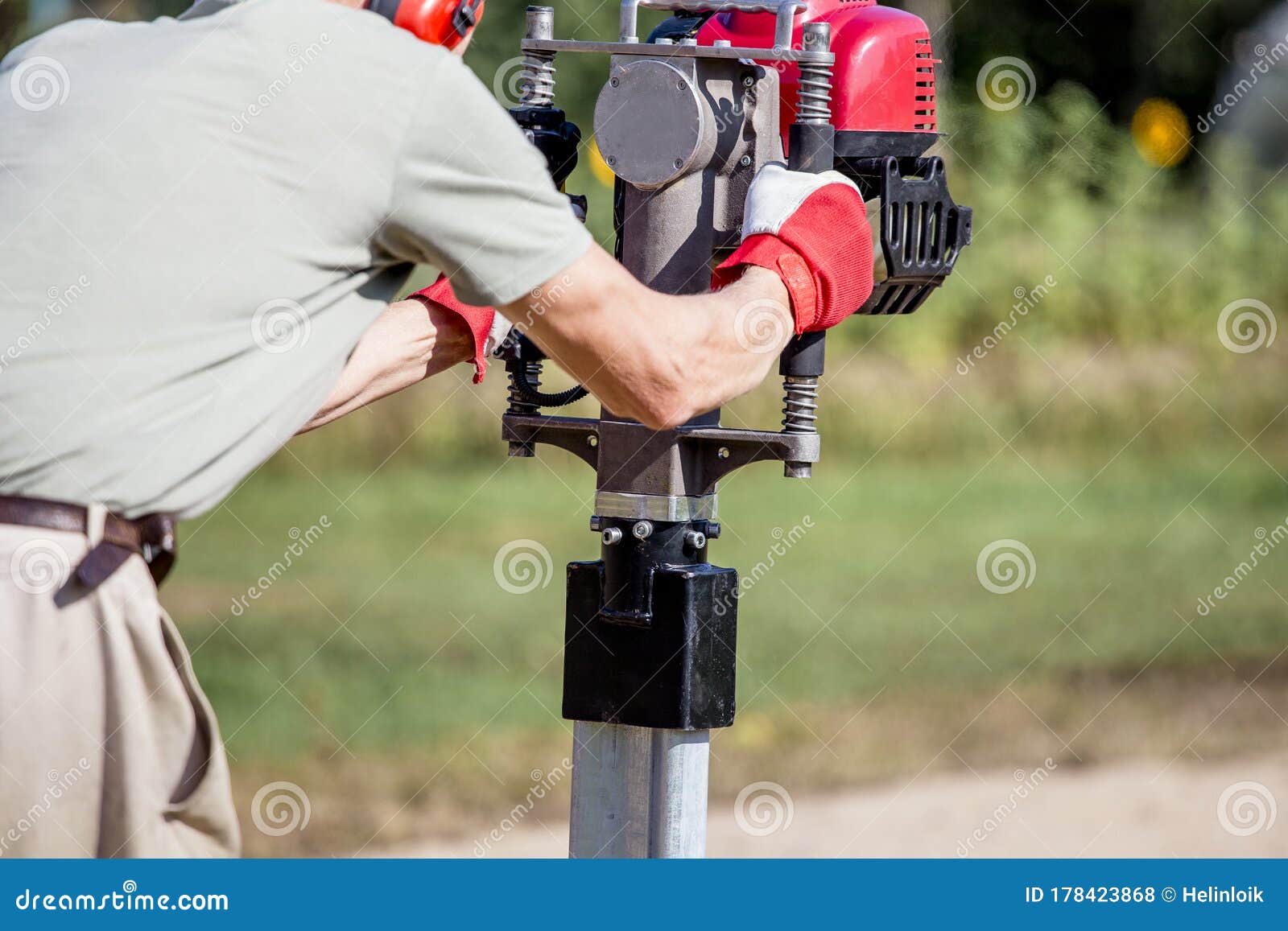 Ramming Vibrating Machine On A Freshly Laid Asphalt Surface. Vibratory ...