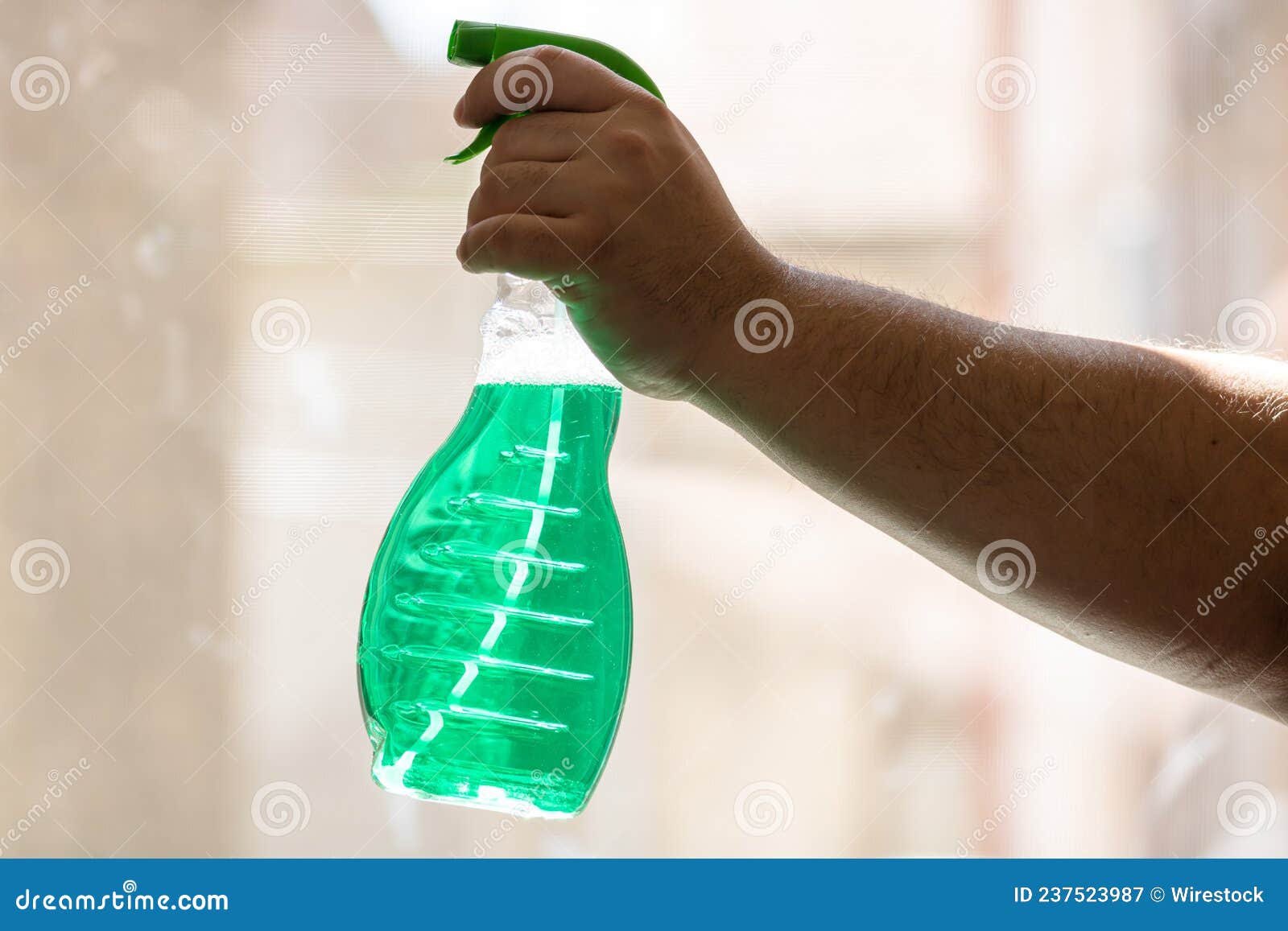 Man Using Green Sprayer - Housekeeping Concept Stock Image - Image of ...