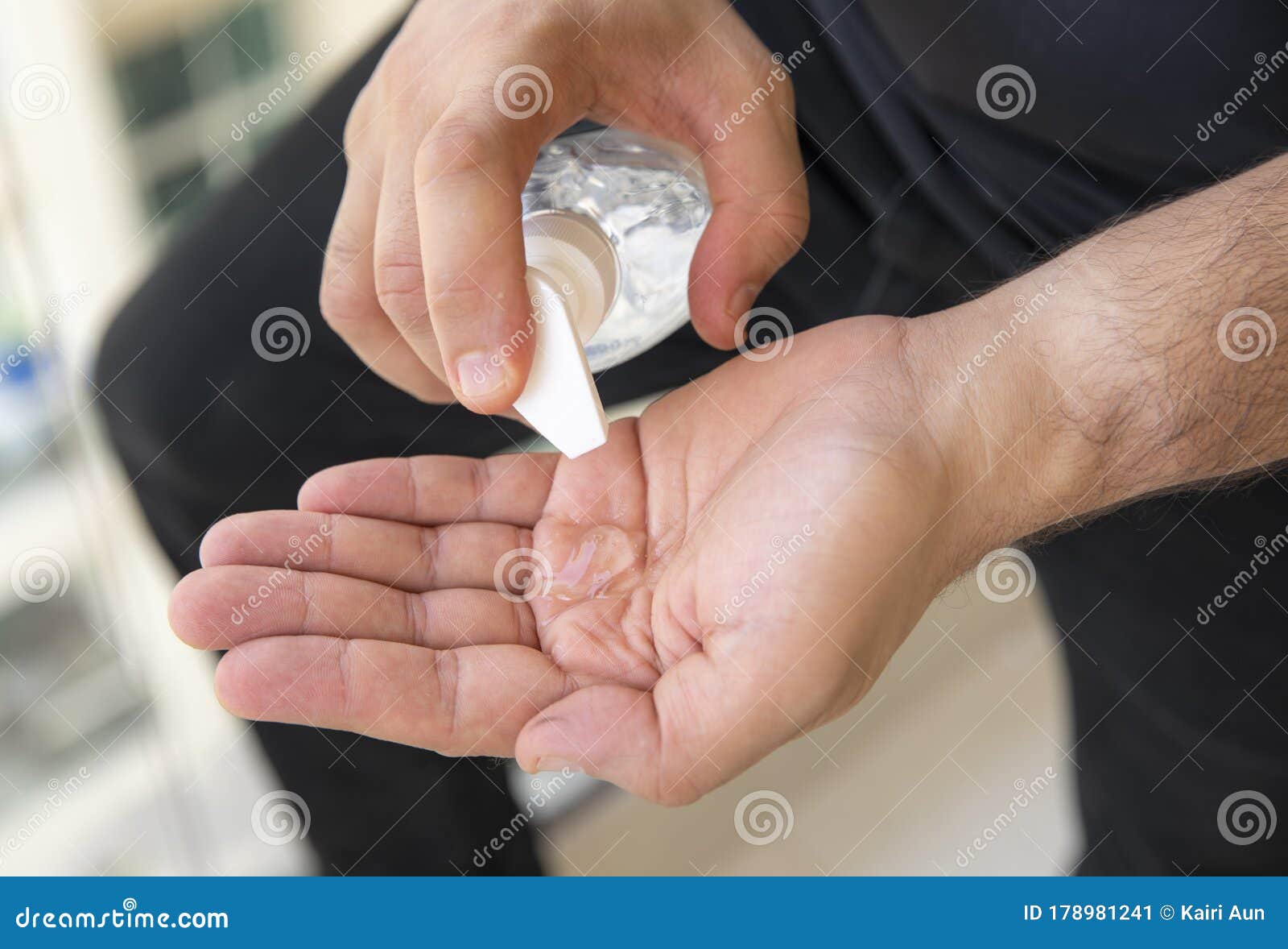 Man Using Hand Sanitizer on His Hands Stock Image - Image of alone ...