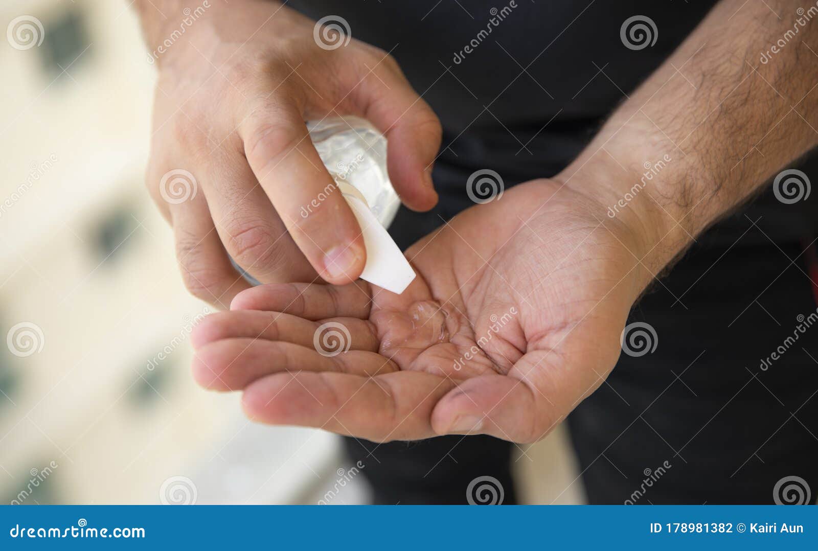 Man Using Hand Sanitizer on His Hands Stock Photo - Image of disease ...