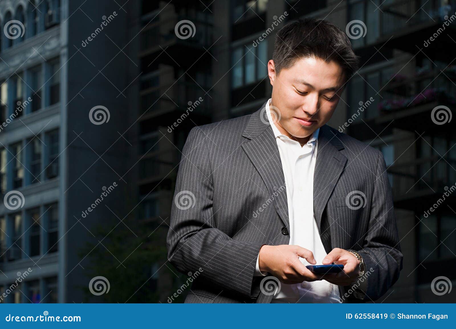 Man Using Handheld Computer Stock Image - Image of people, confidence ...