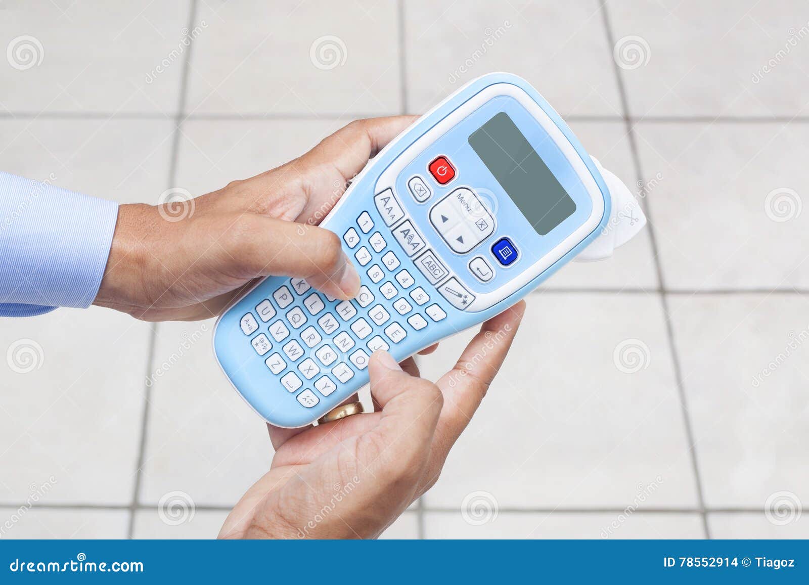 Man Using Handheld Label Maker Machine Stock Photo - Image of sticker ...