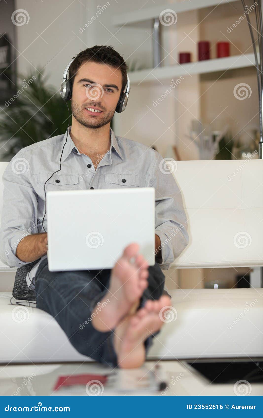 Man using headphones stock photo. Image of download, playlist - 23552616