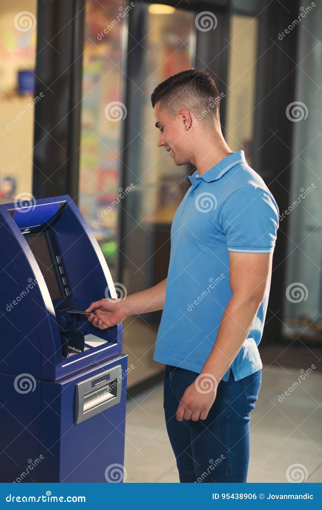 Man Using His Credit Card in an Atm Stock Photo - Image of bank ...